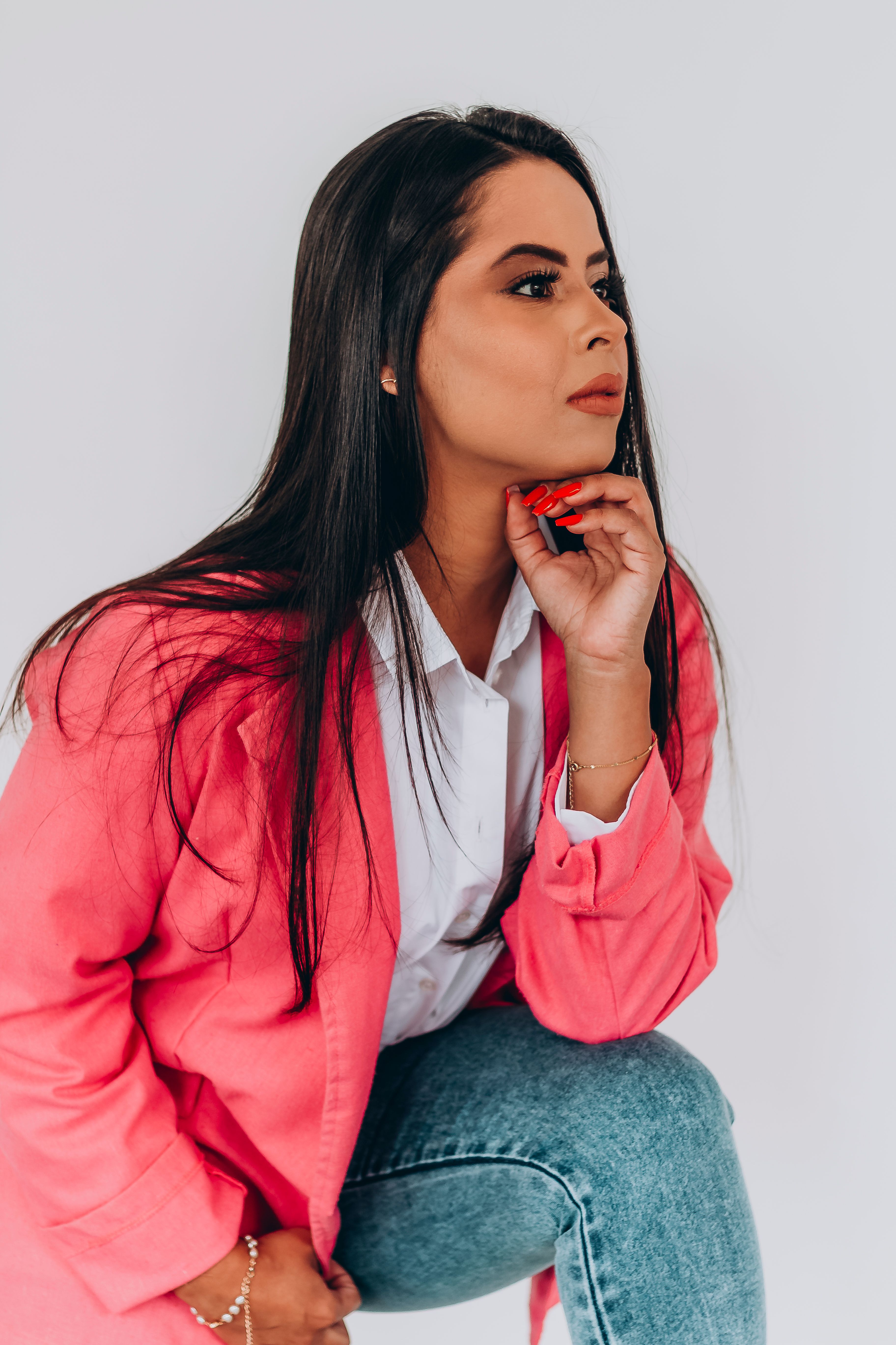 Woman Crouching and Posing · Free Stock Photo