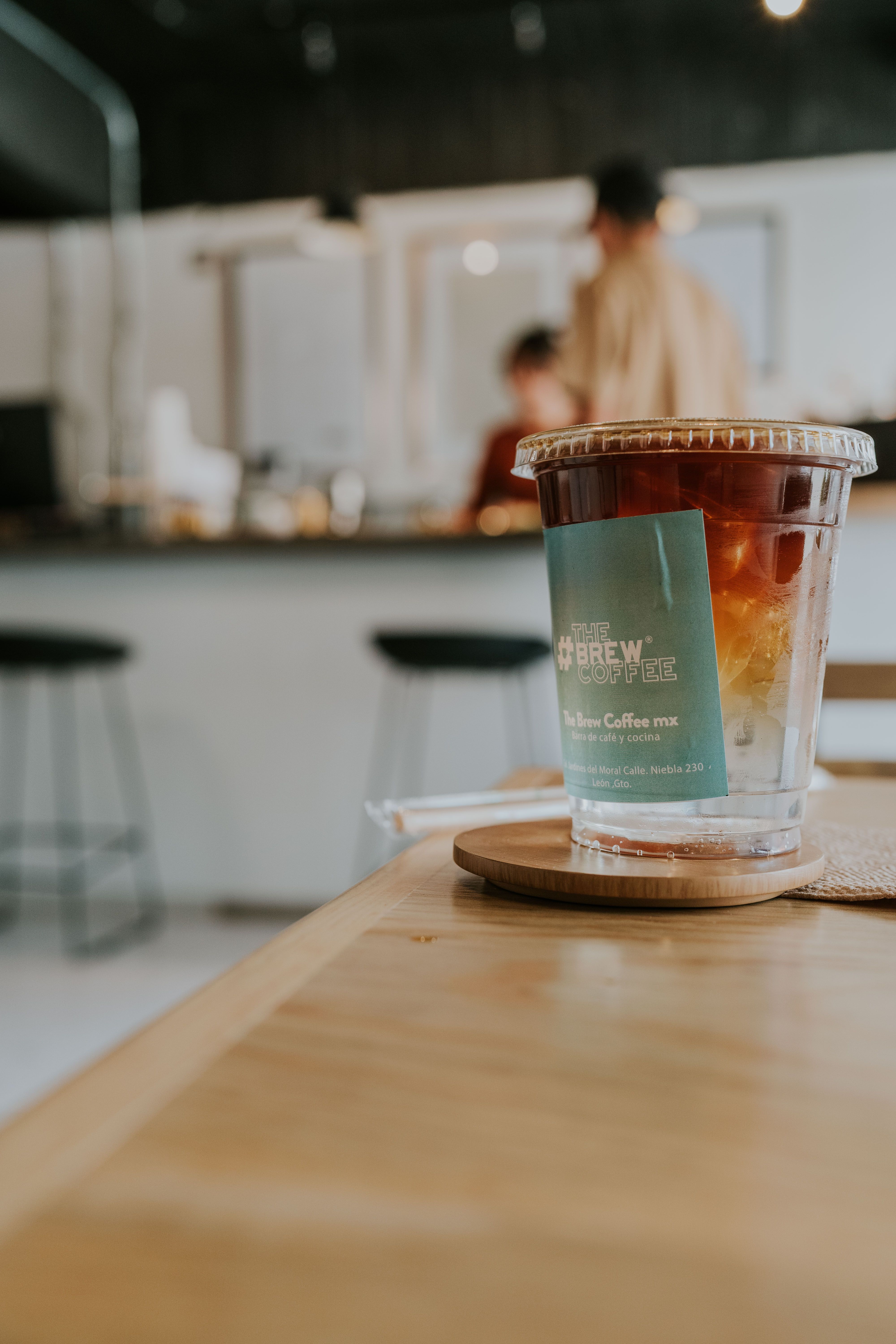 Chilled Coffee in Modern Cafe Setting · Free Stock Photo