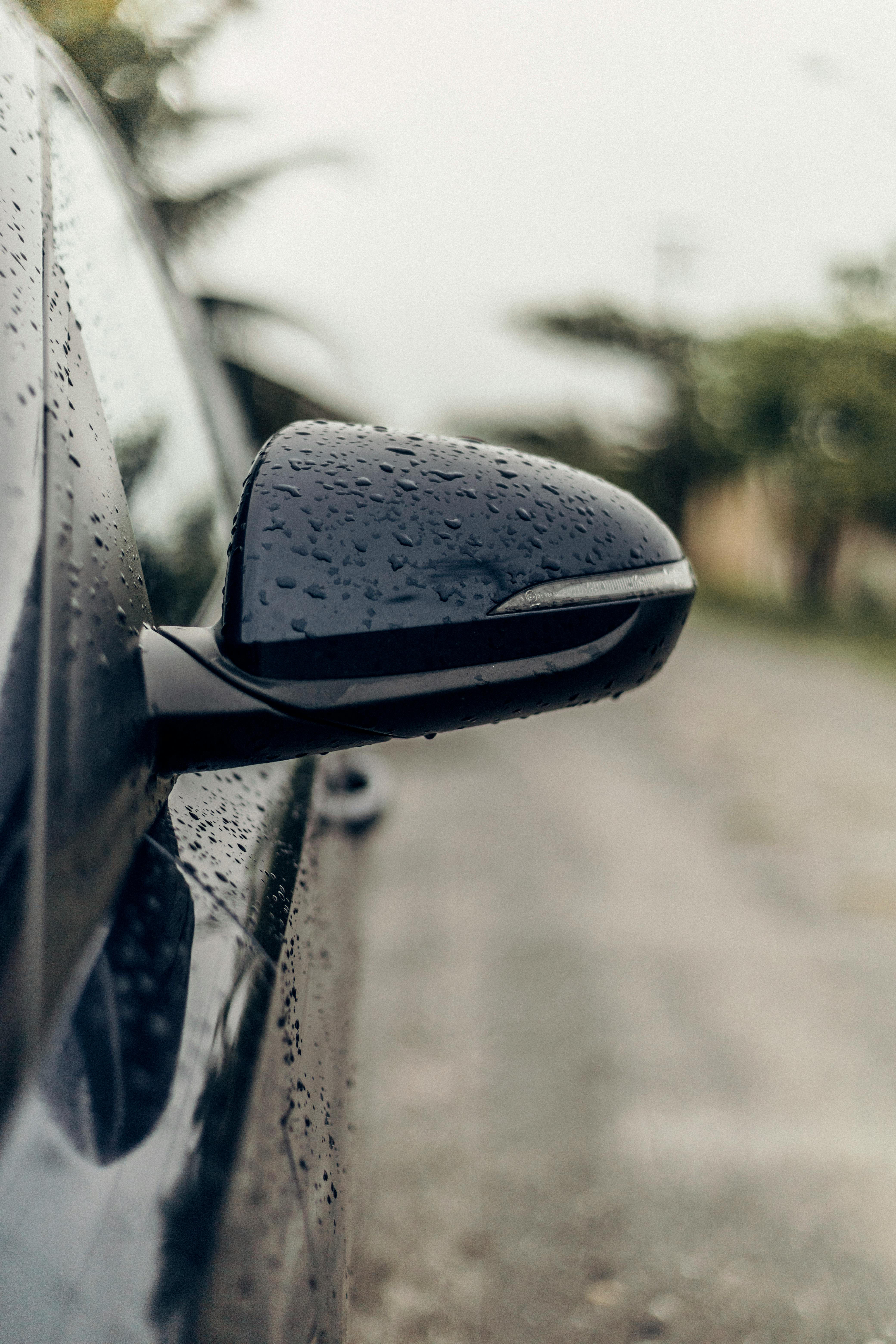 Close-up of Rear View Mirror of a White Car · Free Stock Photo
