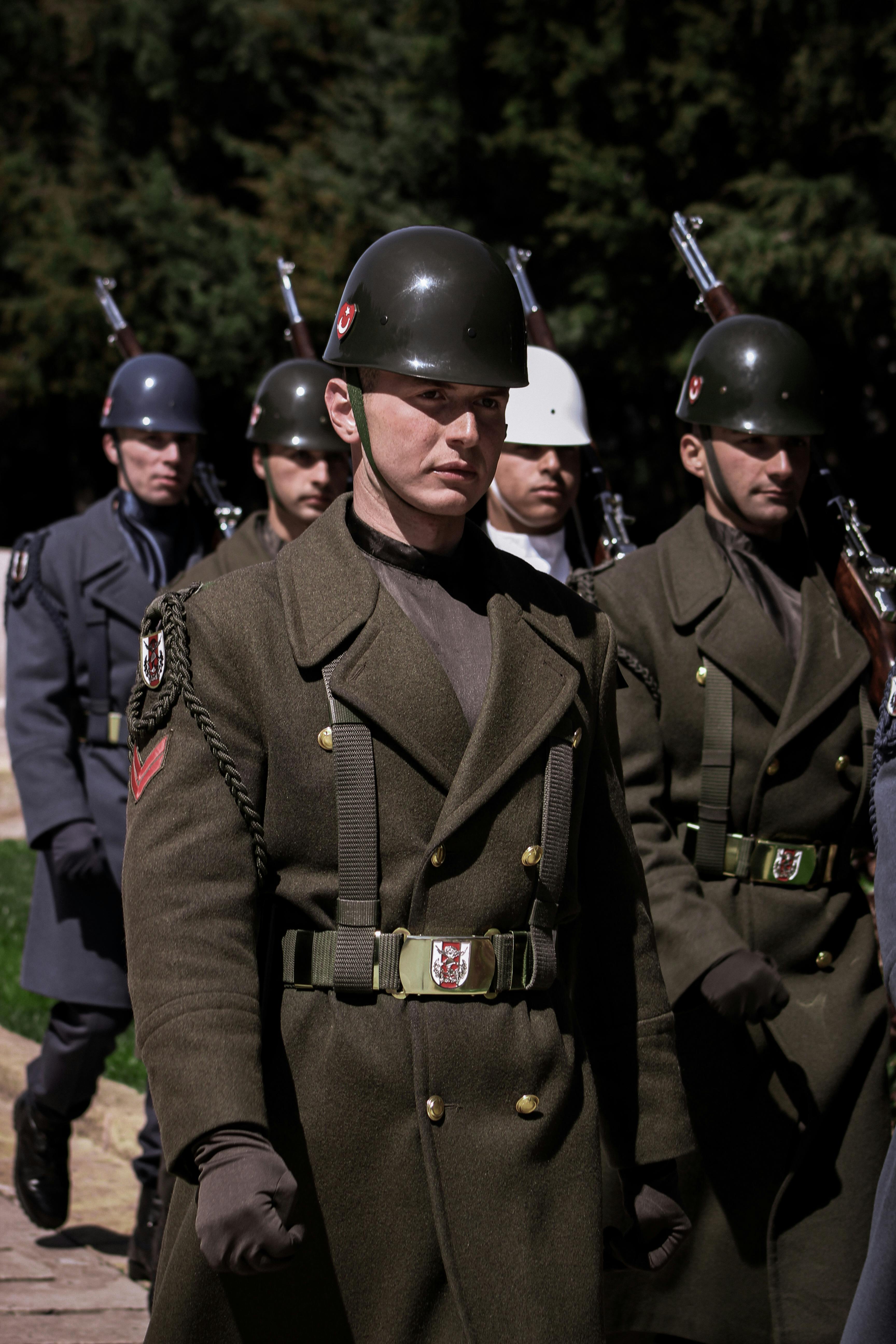 Soldiers Marching in Uniforms · Free Stock Photo