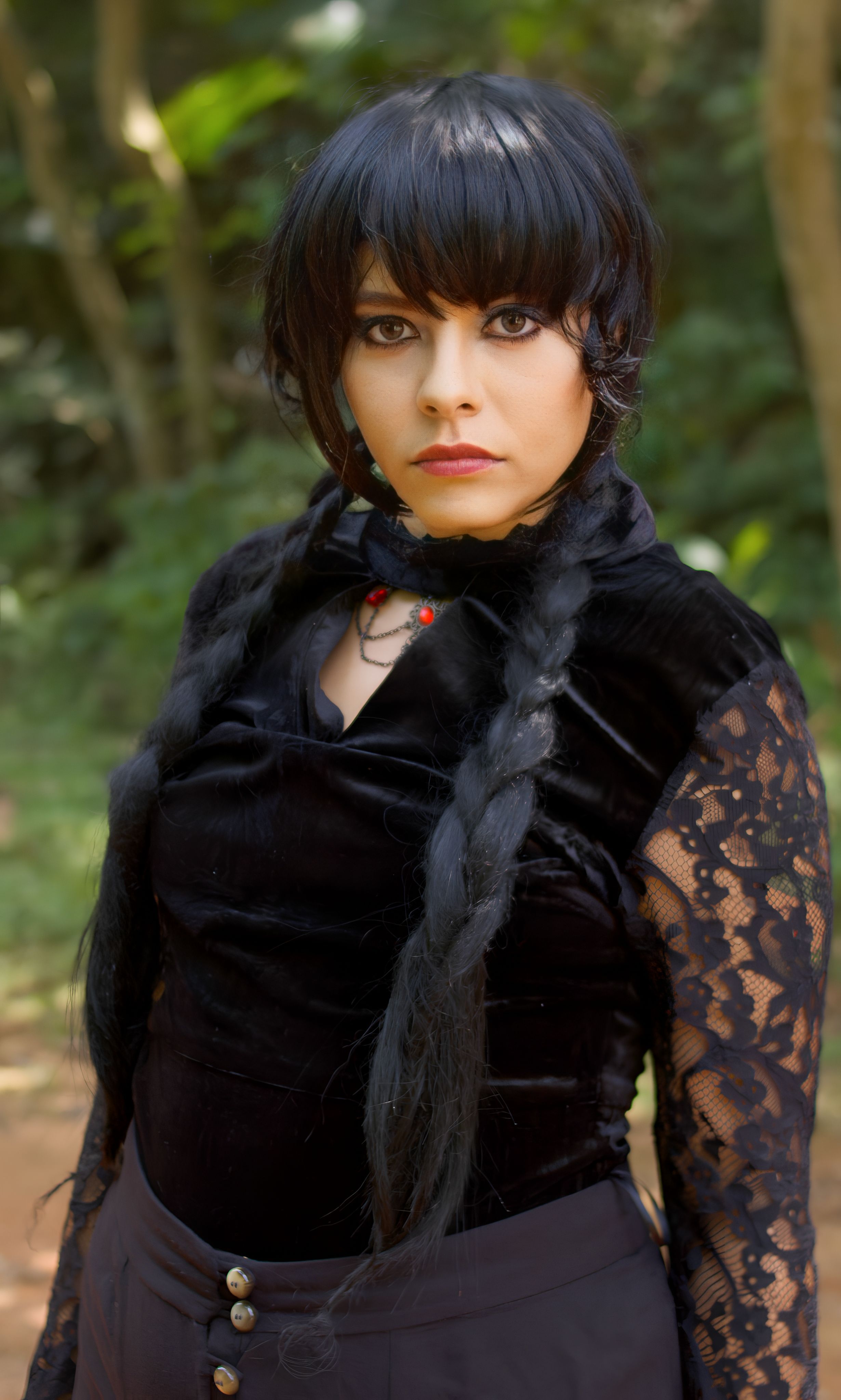Young Woman with Black Hair Wearing a Black Outfit · Free Stock Photo