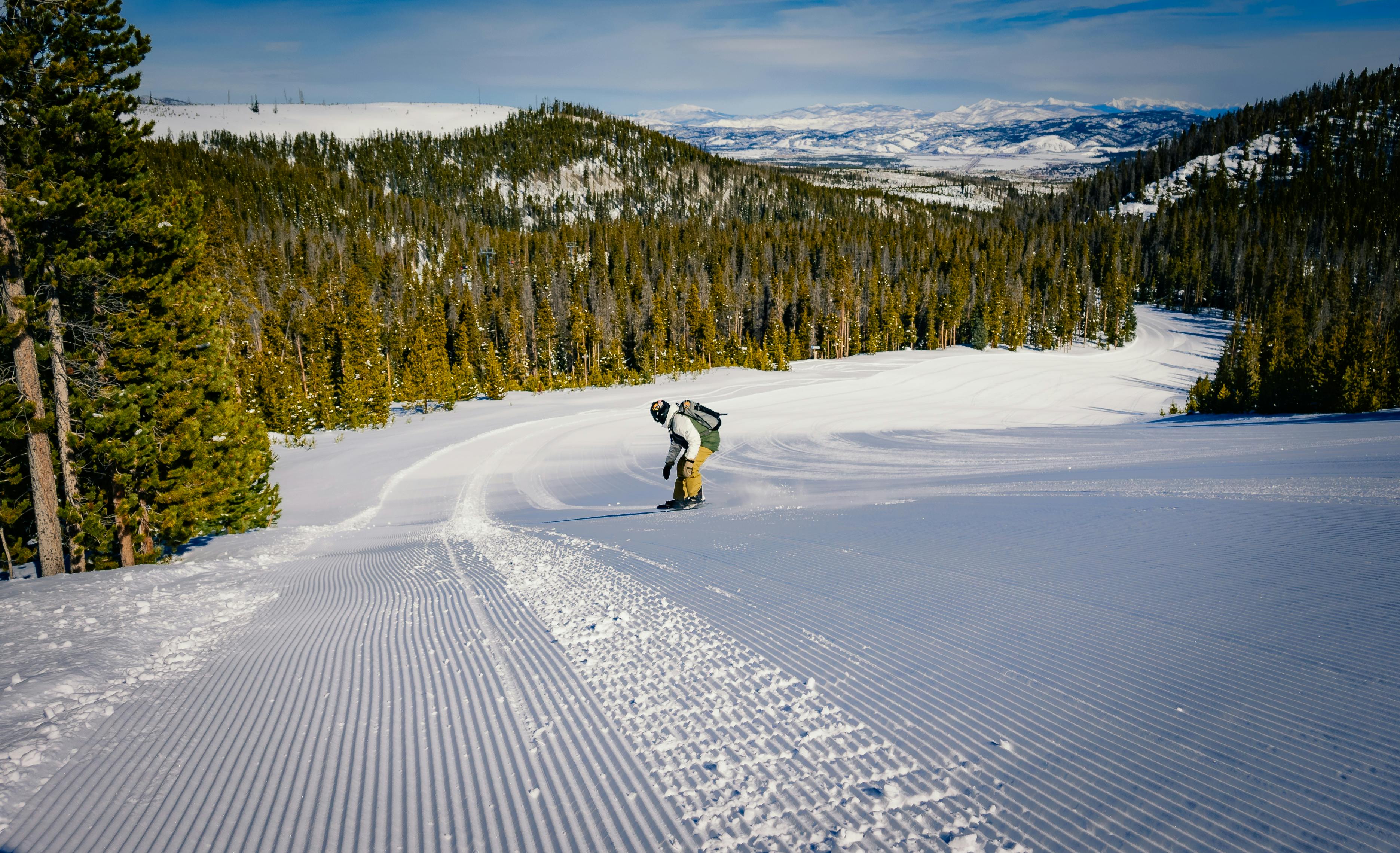 Snowboarder Enjoying a Sunny Winter Day on Mountain Slope · Free Stock ...