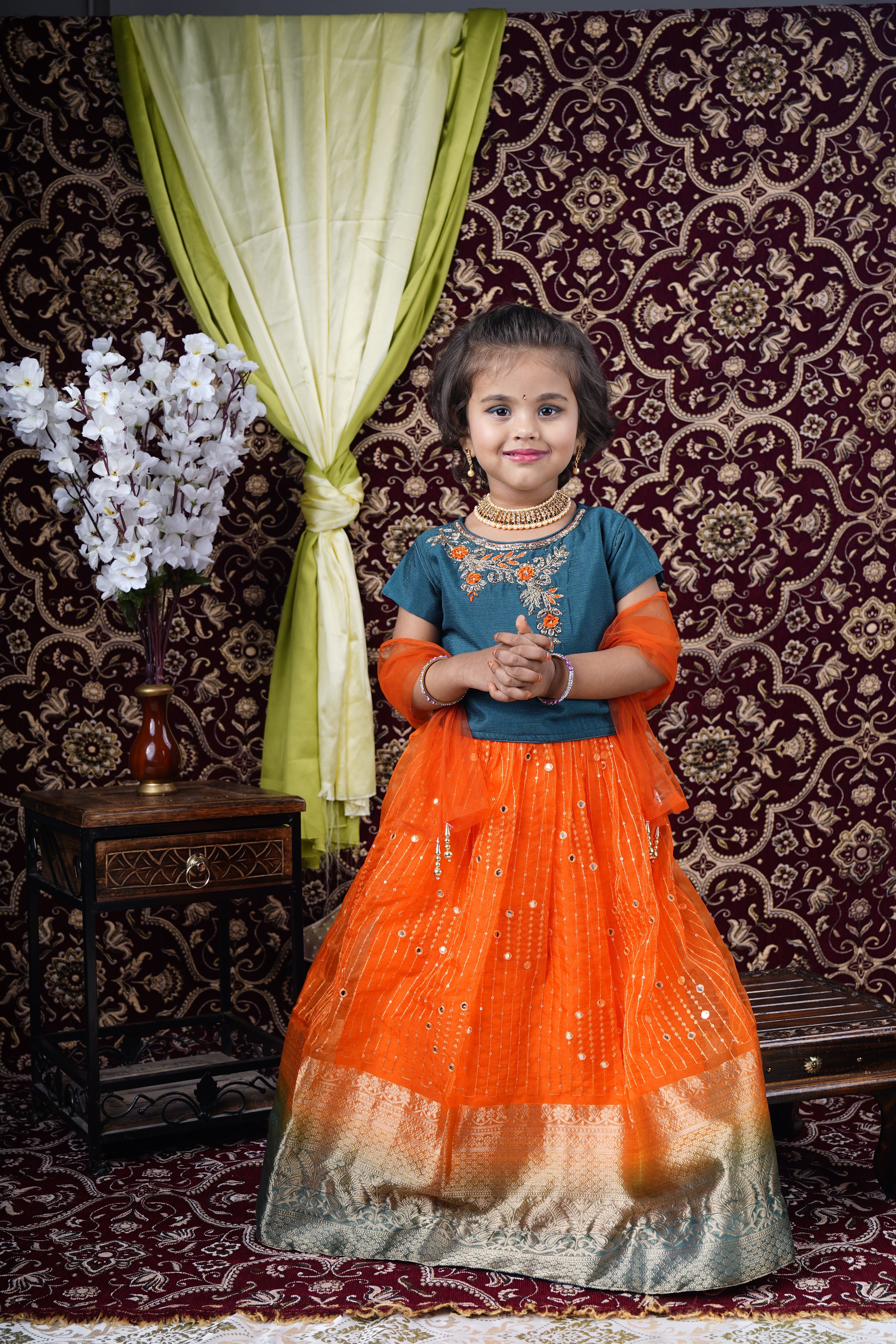 Smiling Girl in Traditional Dress · Free Stock Photo