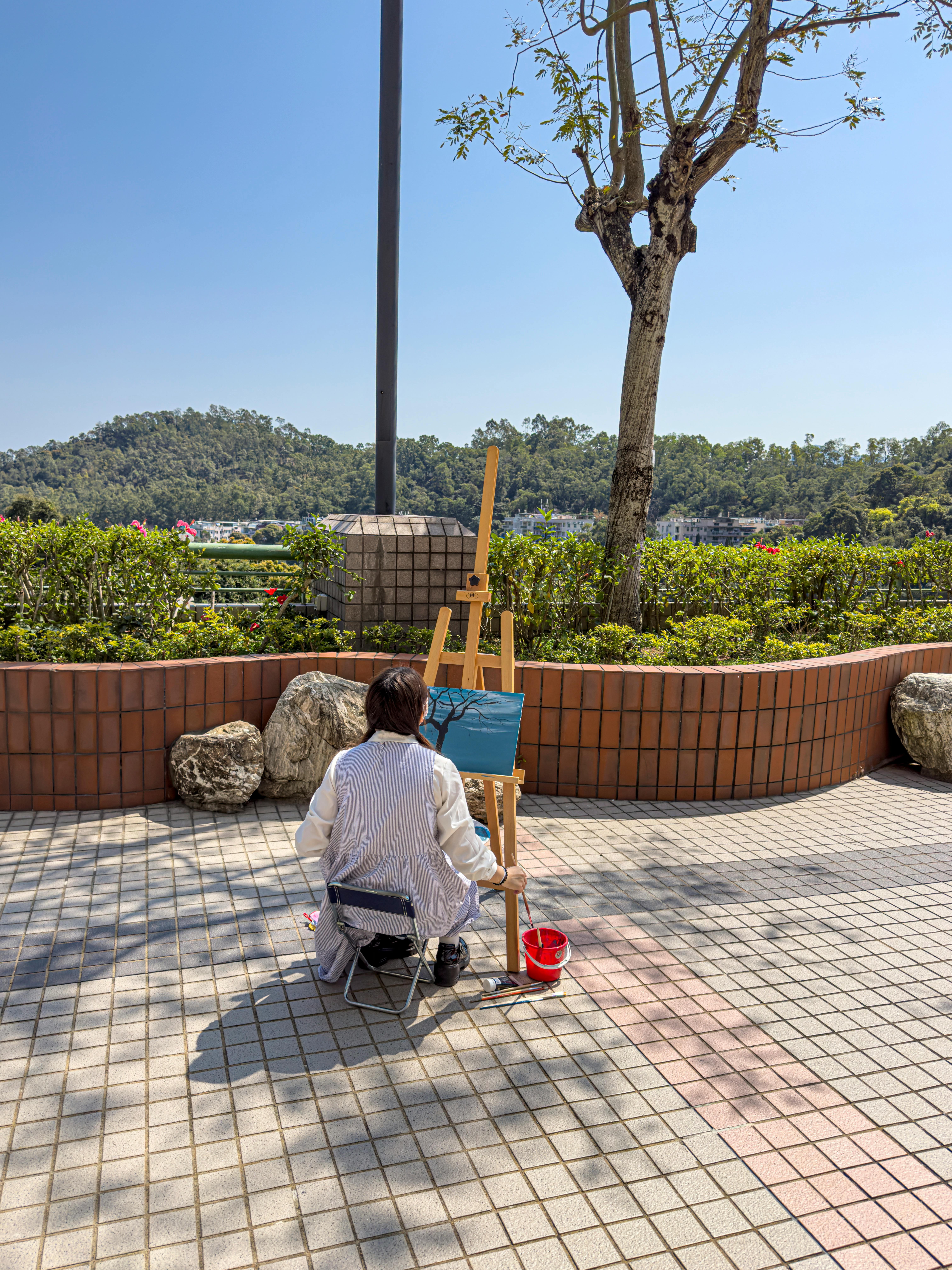 Woman Painting Outside Garden · Free Stock Photo