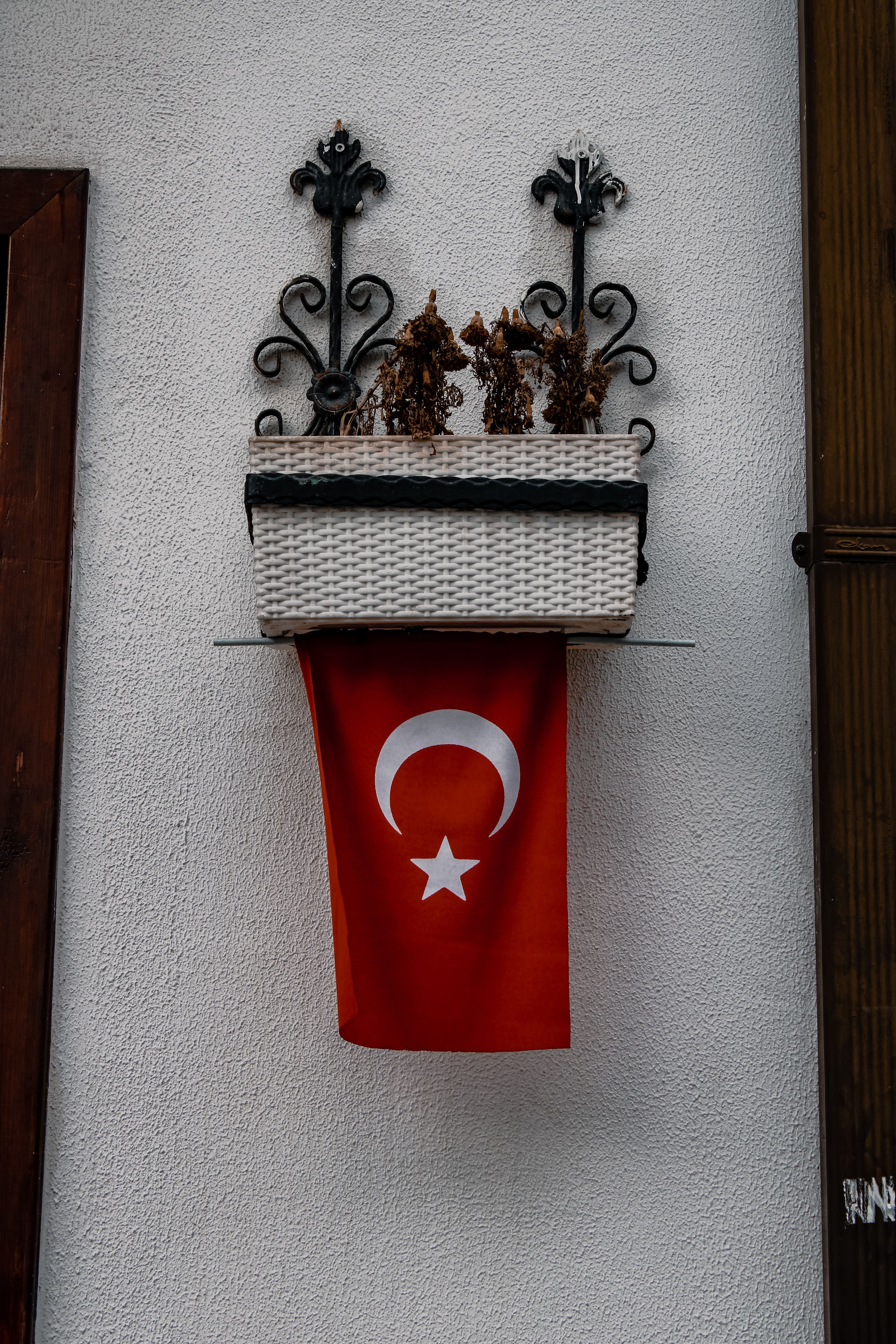 Flag of Turkey under Basket with Decoration on Wall · Free Stock Photo