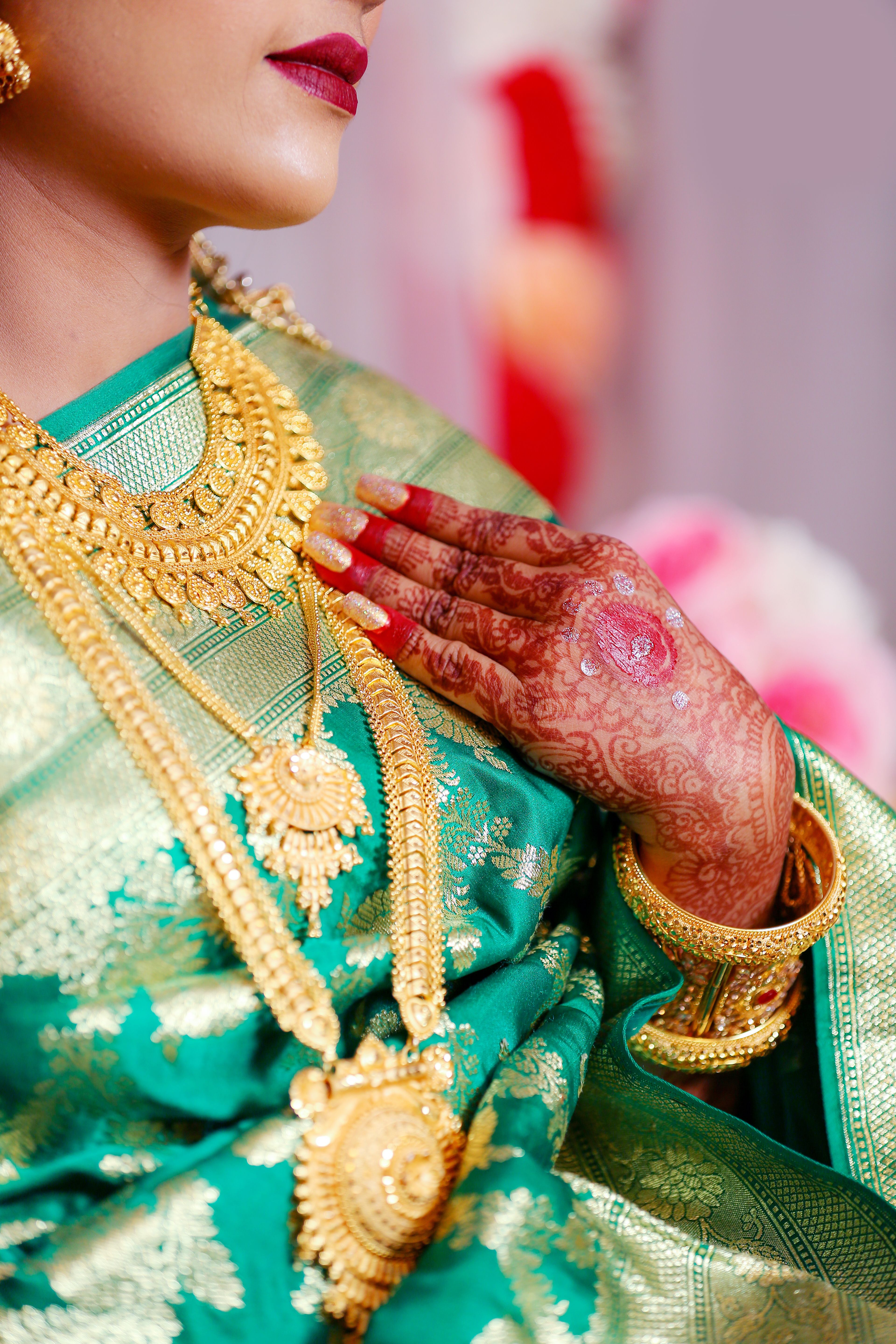 Close-up of Woman Wearing Jewelry and Henna Tattoos on Her Hands · Free ...