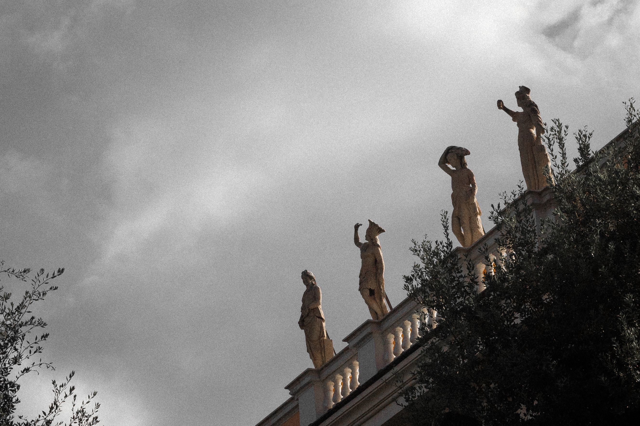 Low Angle Shot of Sculptures on a Terrace · Free Stock Photo