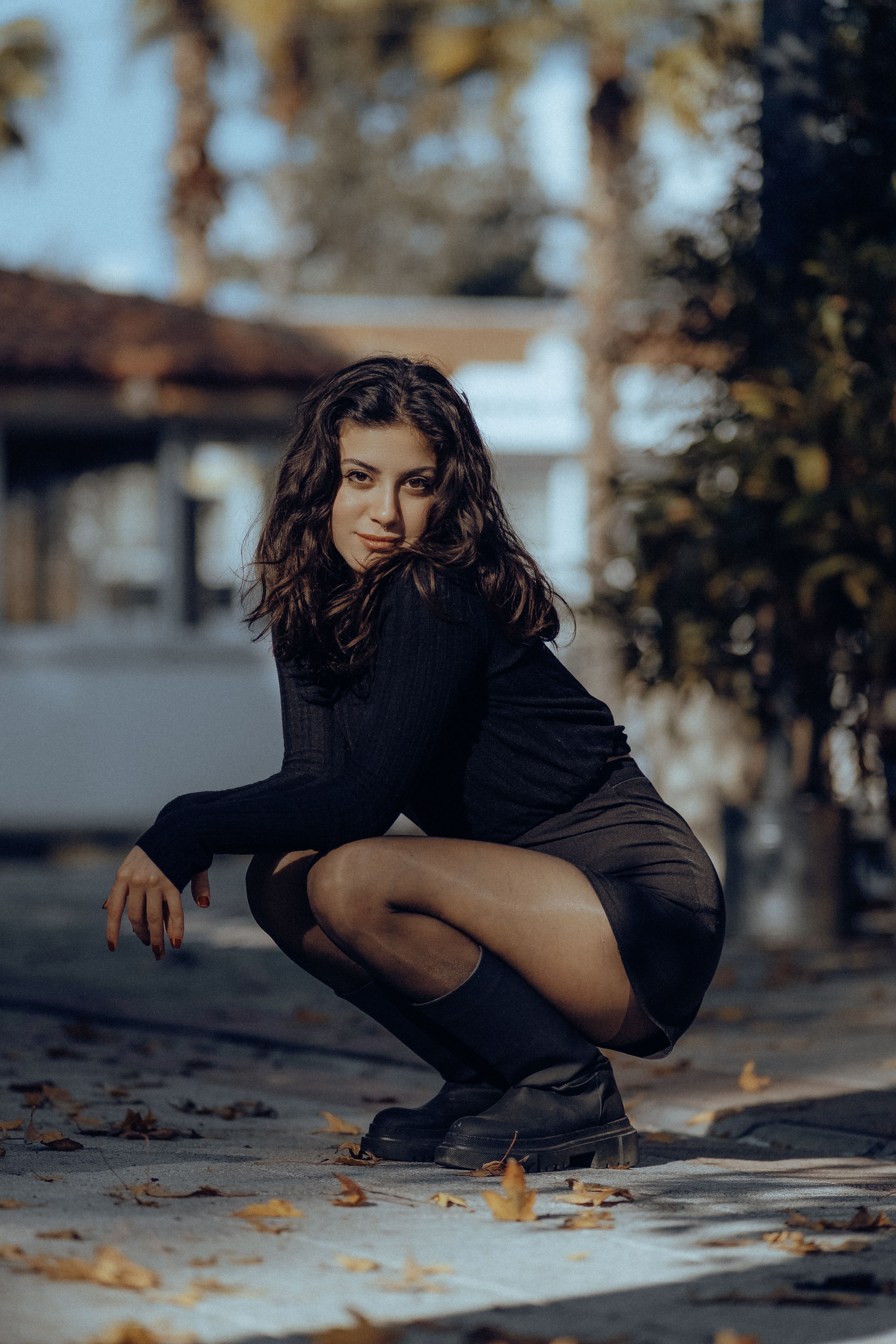 Portrait of a Woman Crouching · Free Stock Photo