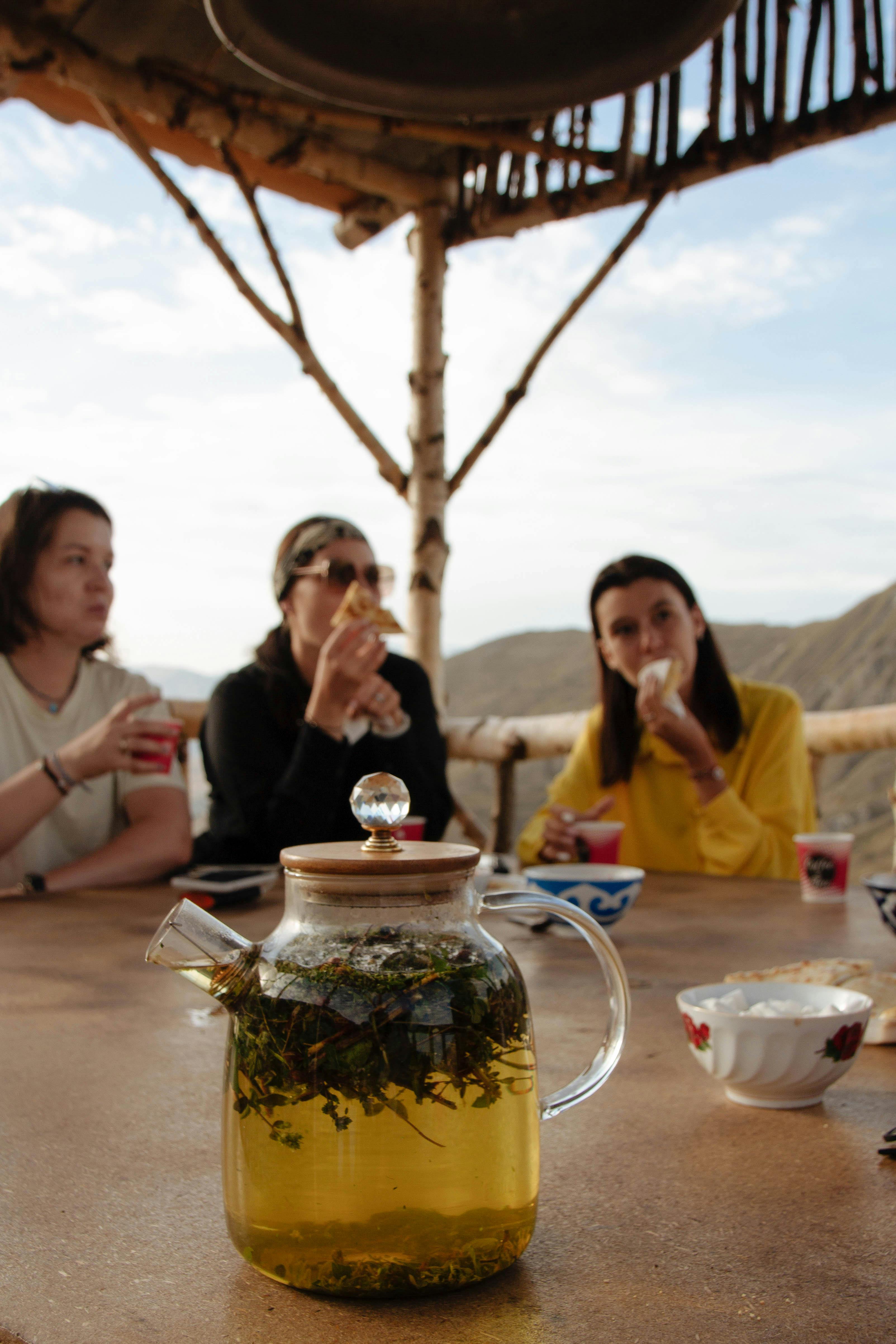 Pitcher on Table and People Sitting behind · Free Stock Photo