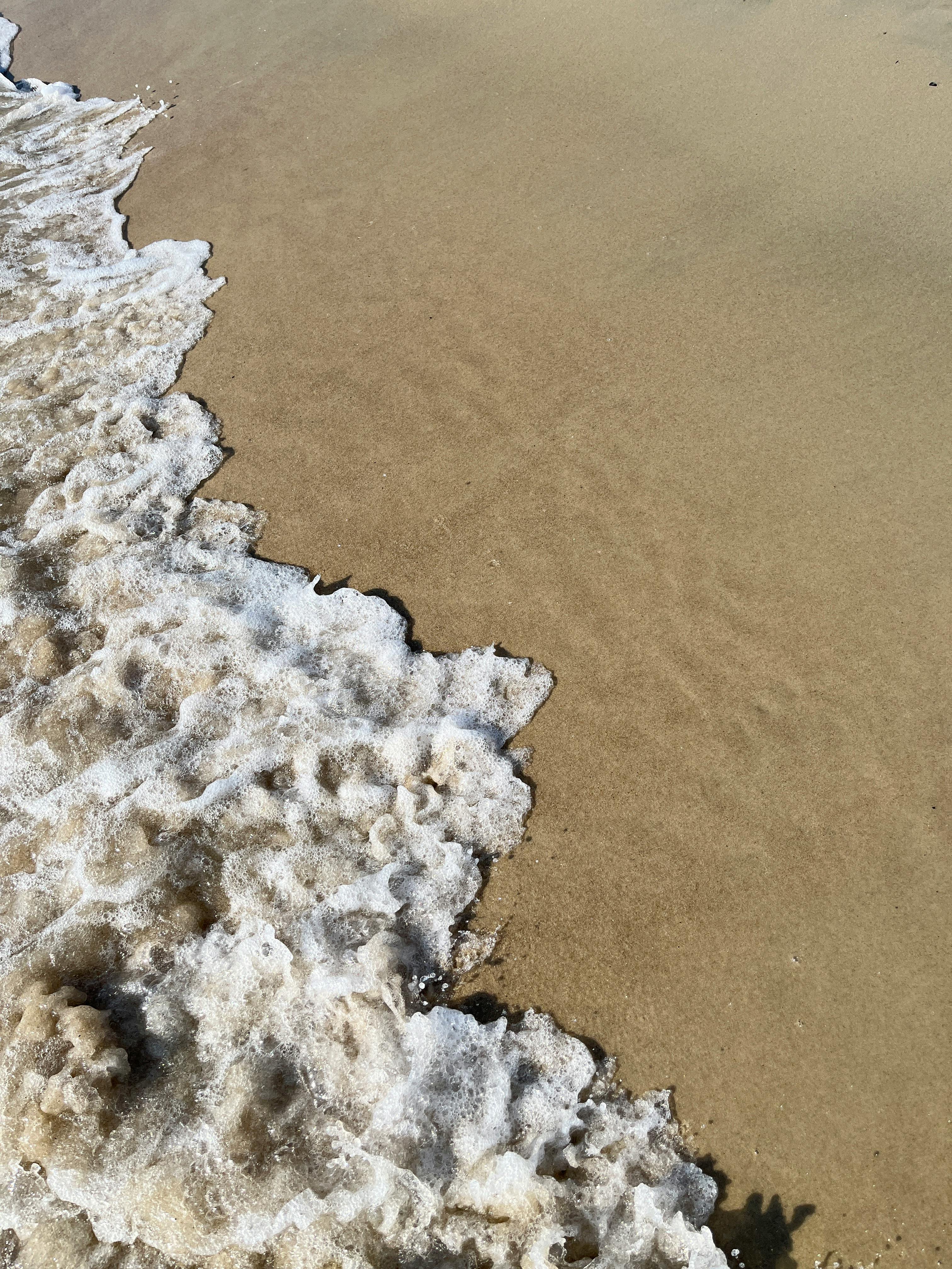 Sea Foam on Beach · Free Stock Photo