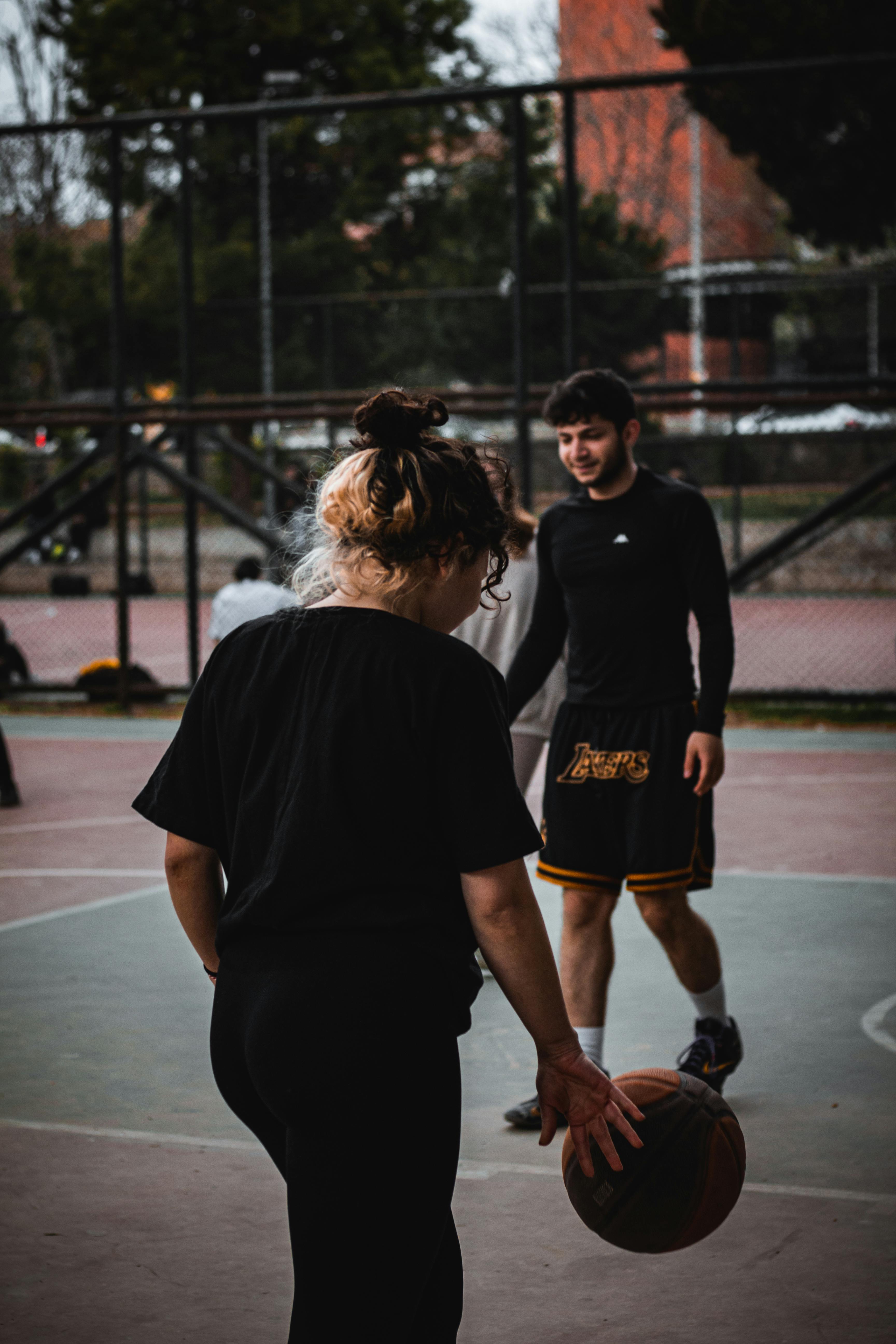 Photo of Young People Playing Basketball · Free Stock Photo