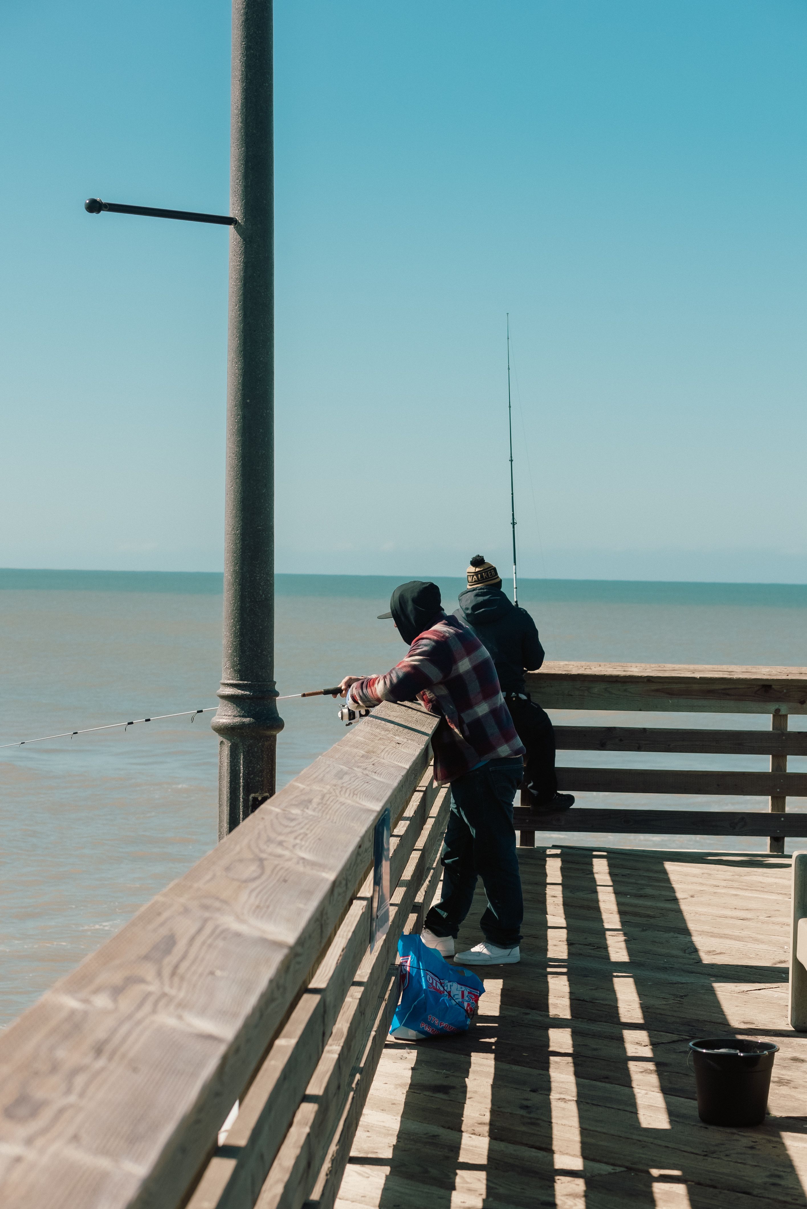 Man Standing on Platform on Water · Free Stock Photo