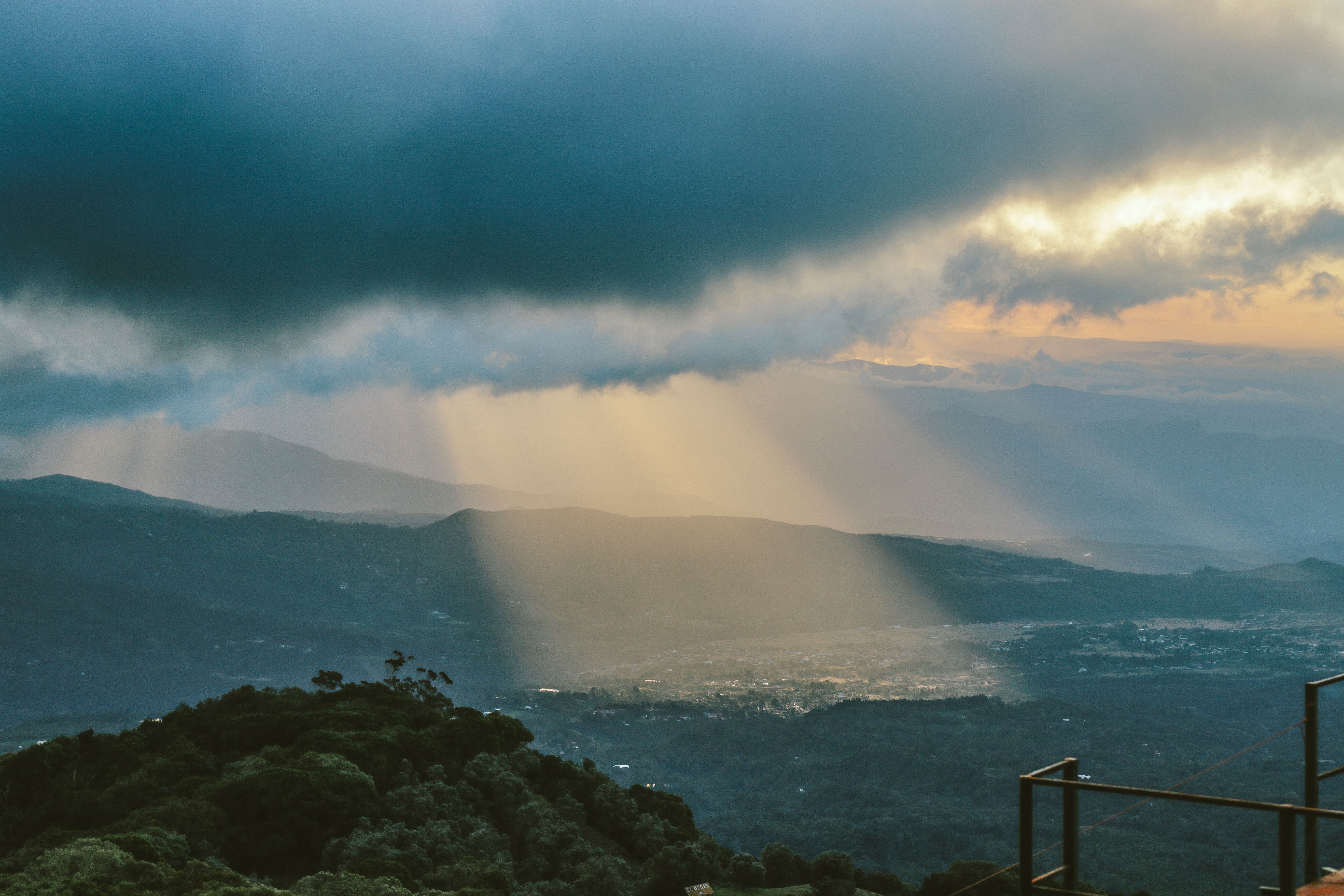 Sunlight Beaming Through Clouds · Free Stock Photo