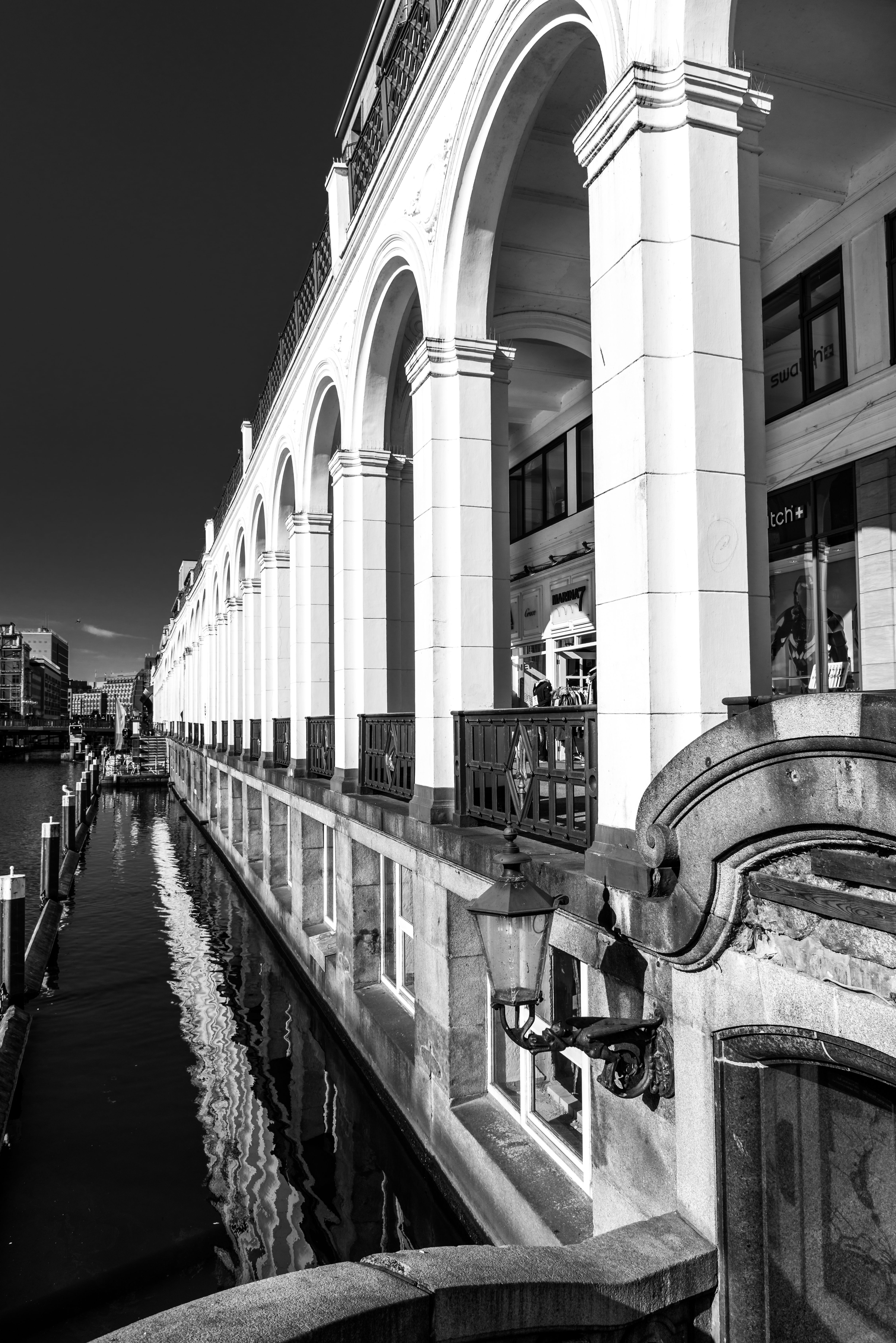Colonnade next to River · Free Stock Photo