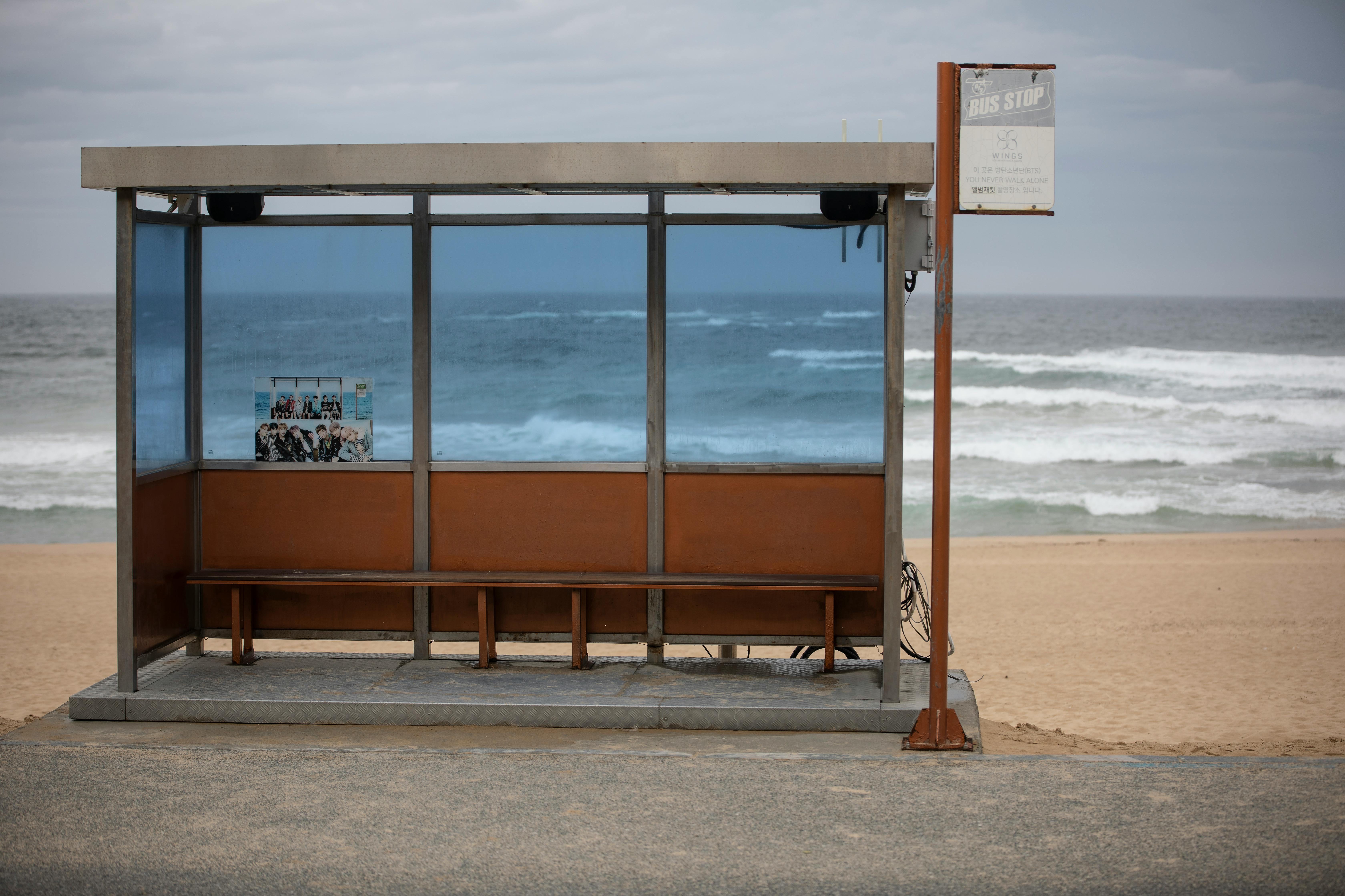Empty Bus Stop on Beach · Free Stock Photo