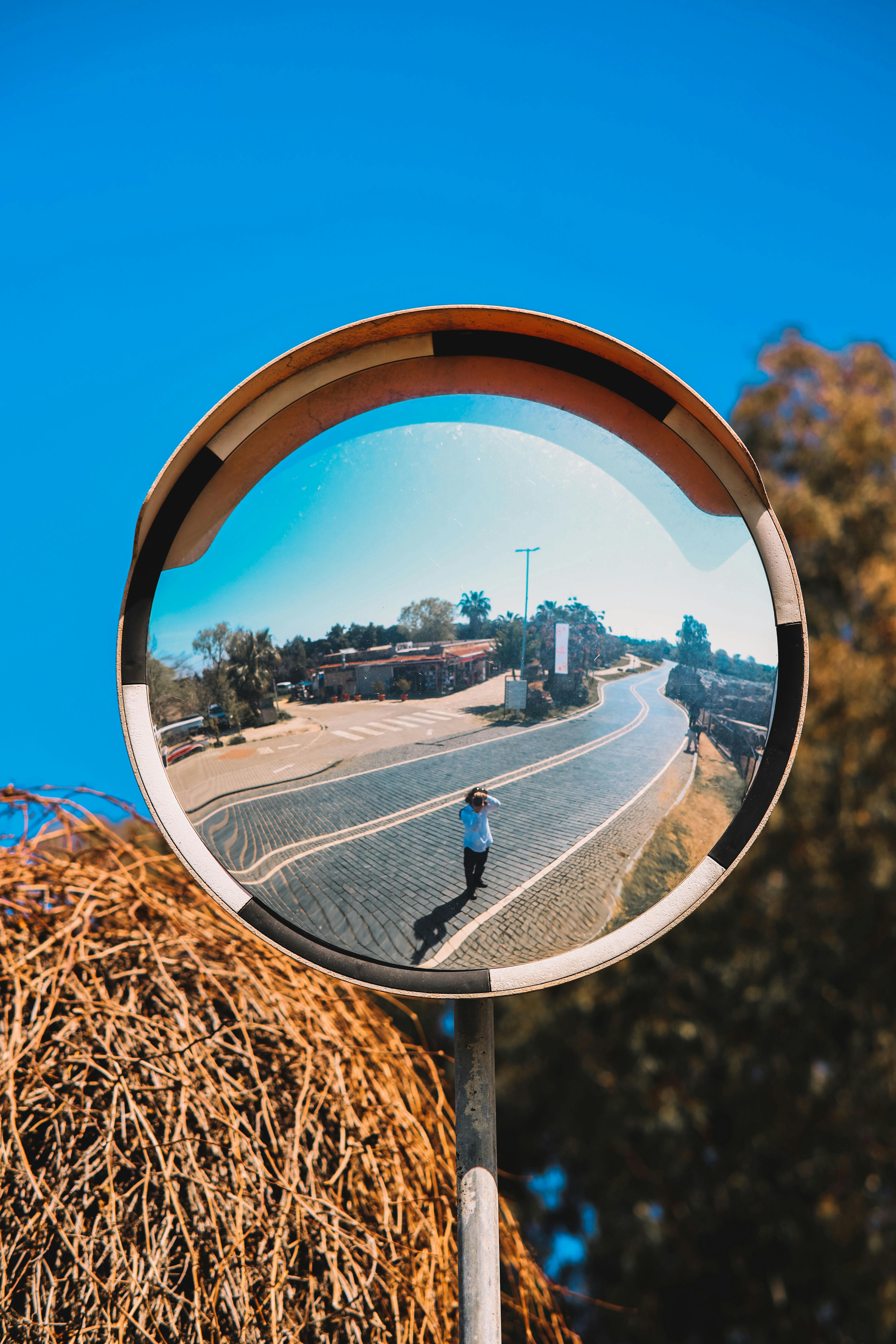 Standing Person Reflection in Mirror in Town · Free Stock Photo