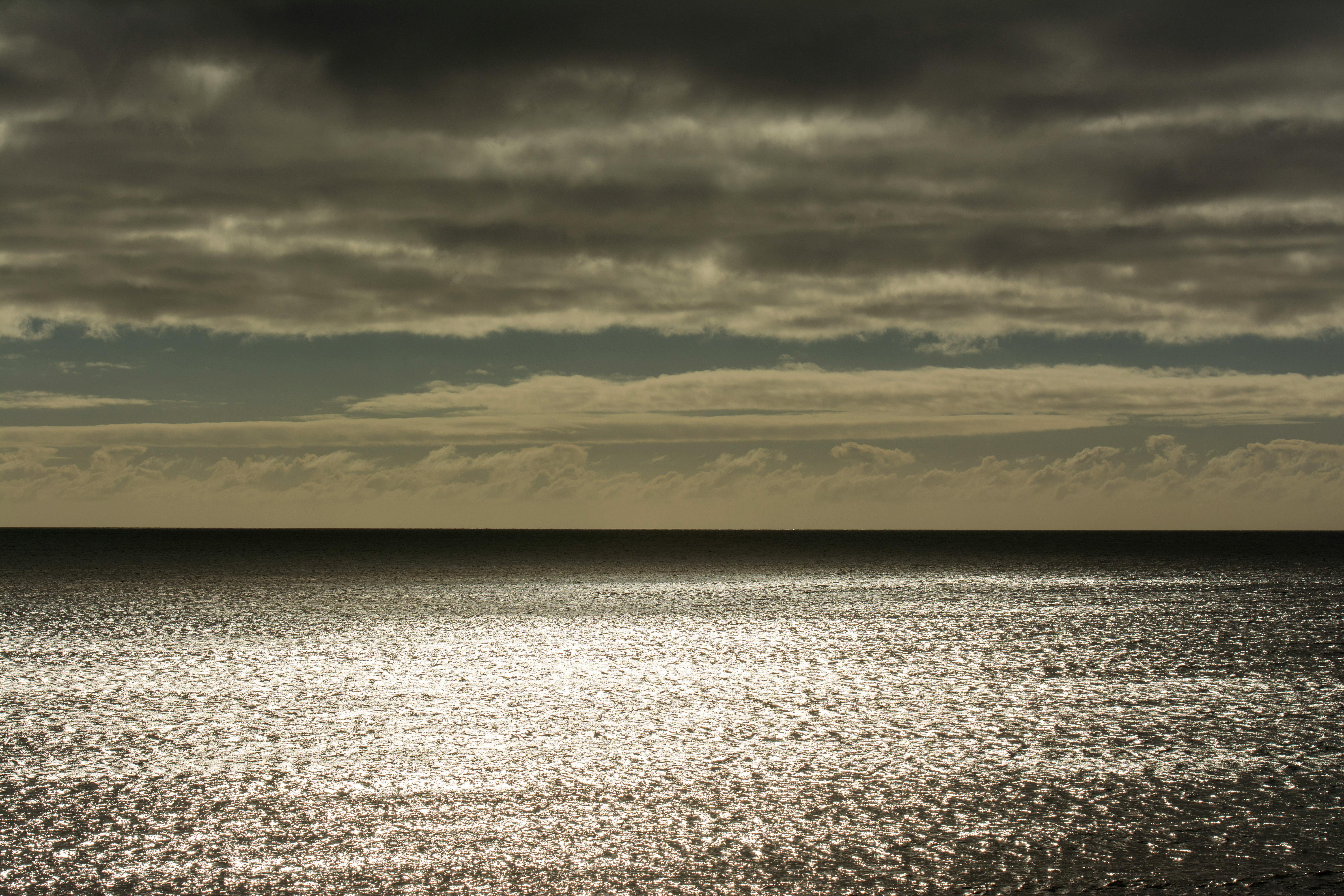 Shining Sea under Clouds · Free Stock Photo