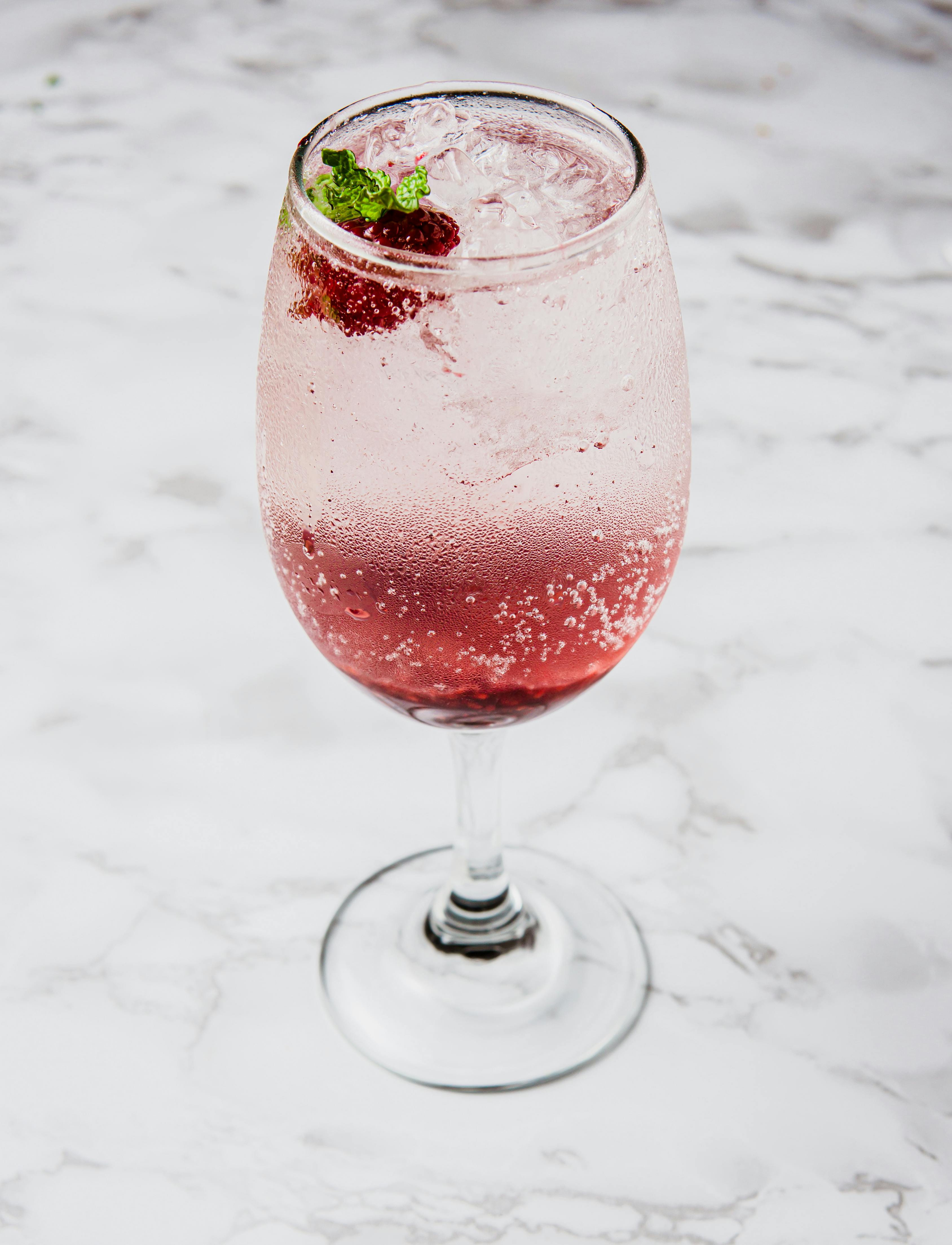 Pink Cocktail Drinks with Slices of Red Orange · Free Stock Photo