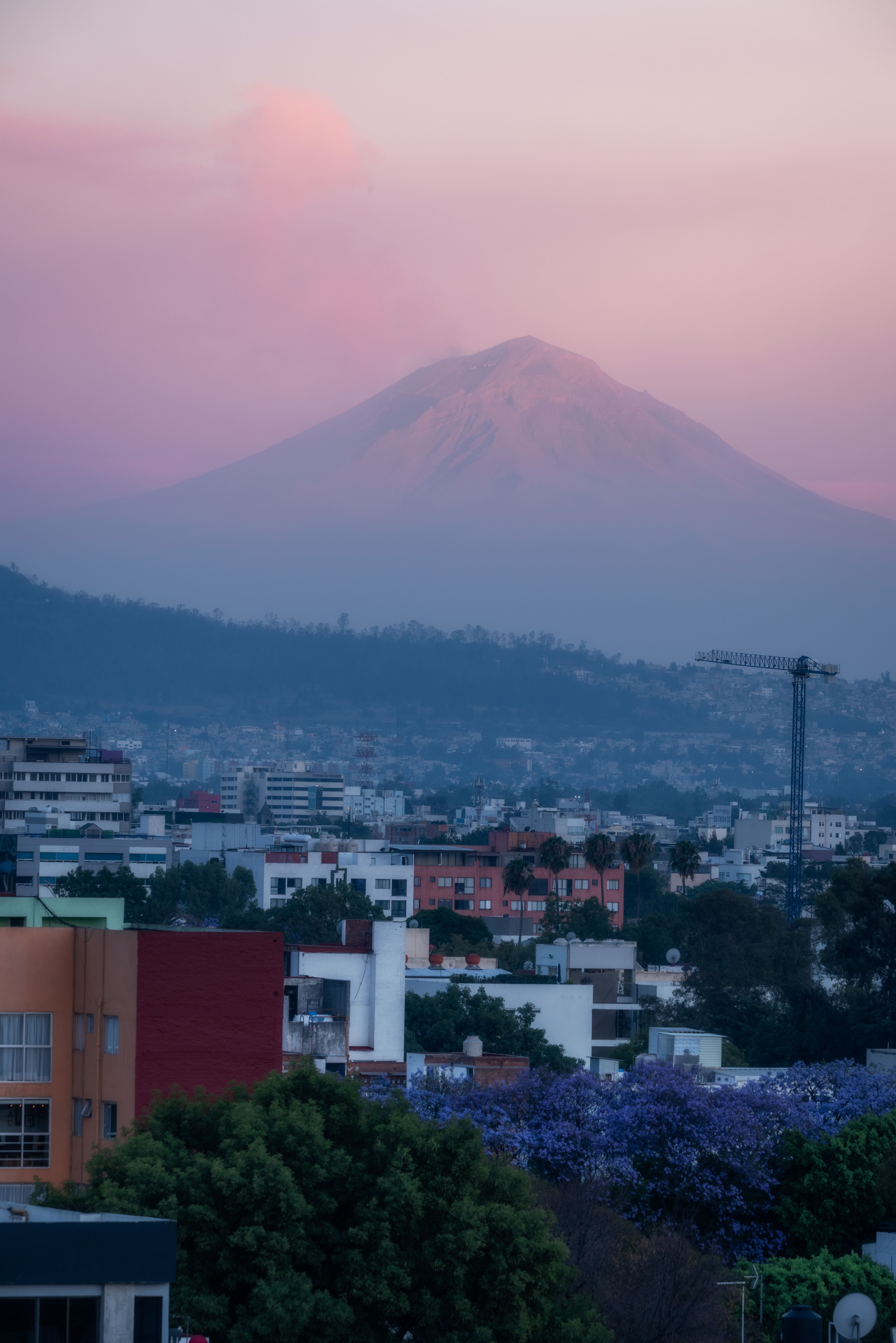 Volcano over Town at Dusk · Free Stock Photo