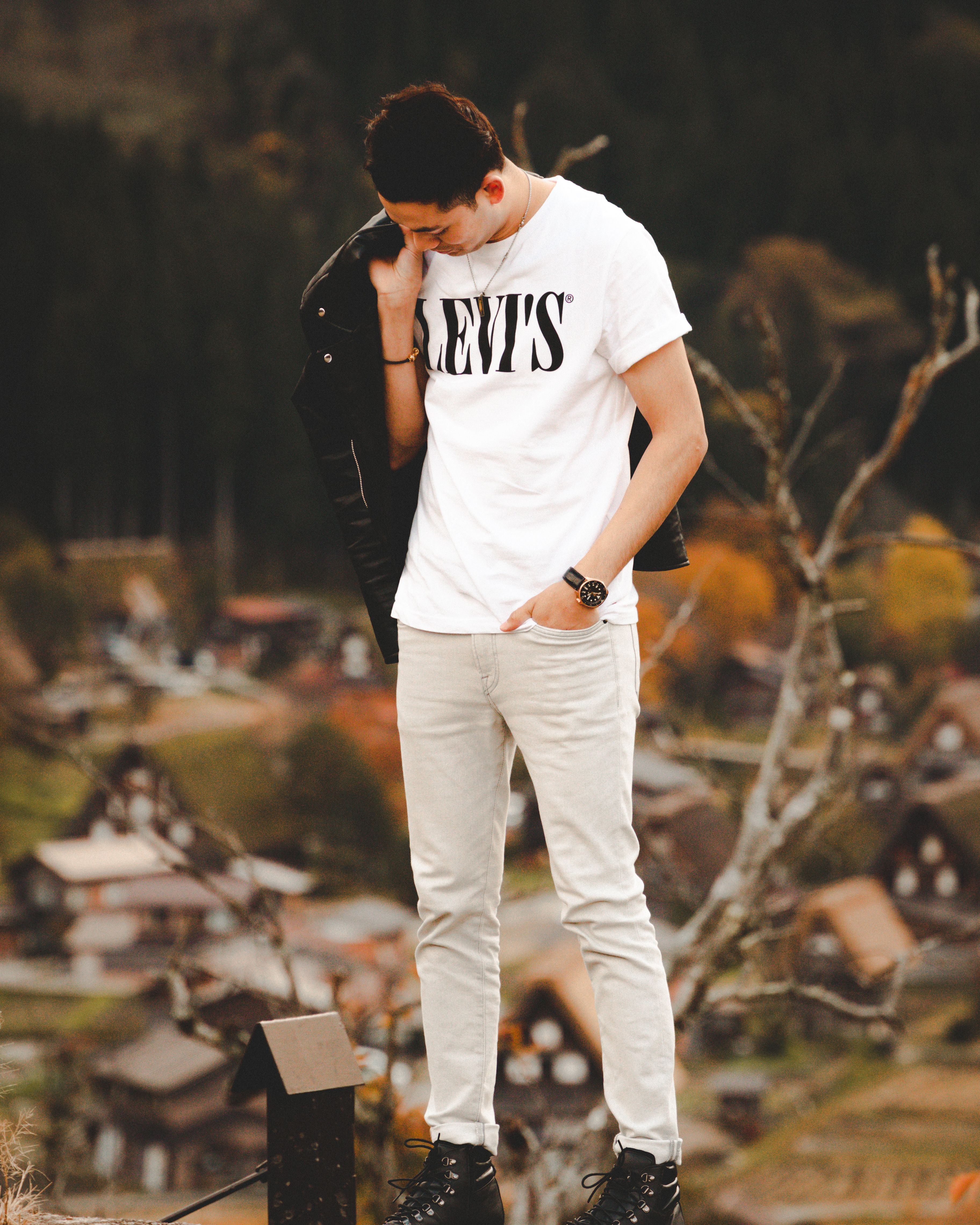 Man Posing in White T-shirt · Free Stock Photo