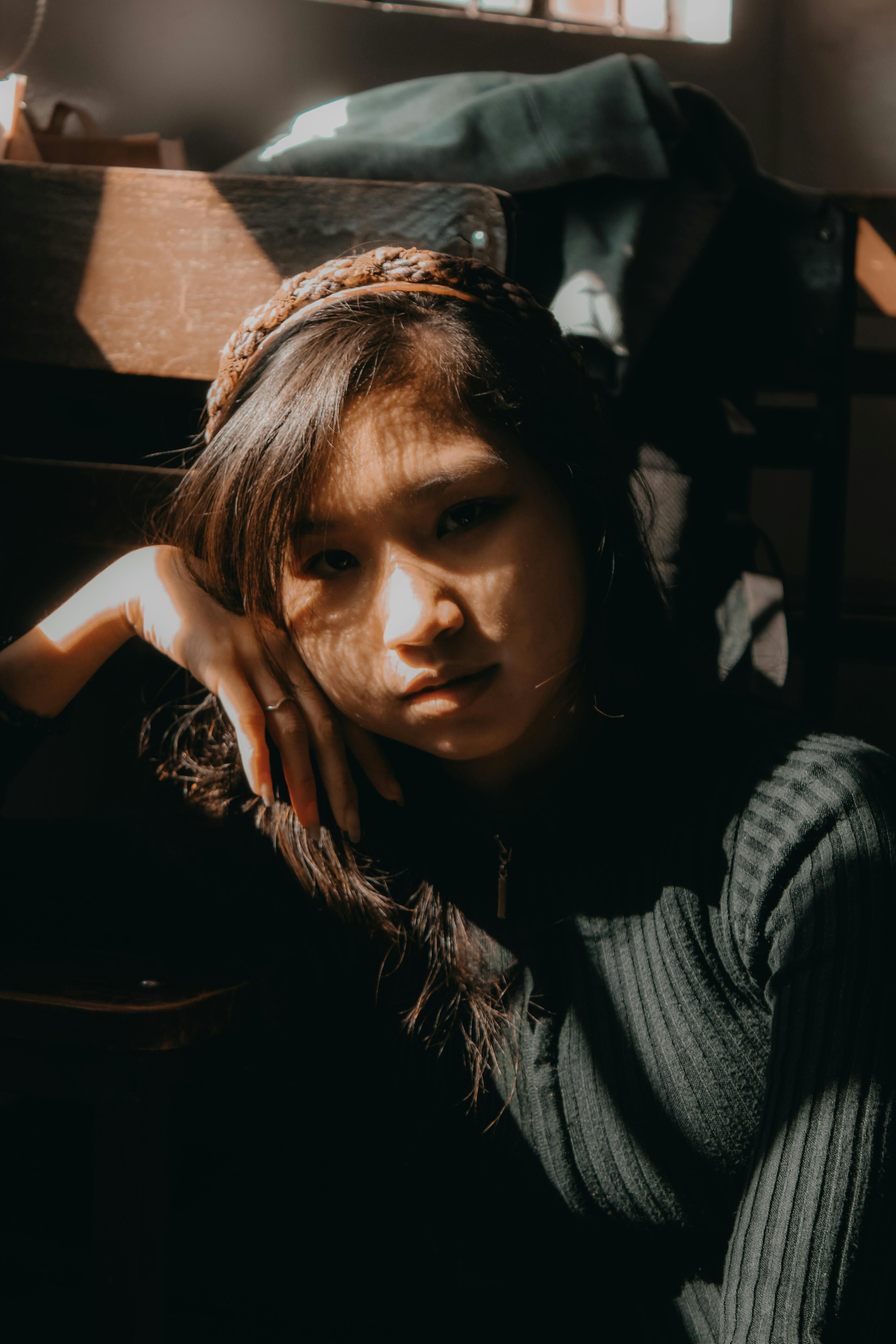 Sunlit Face of Posing Woman · Free Stock Photo