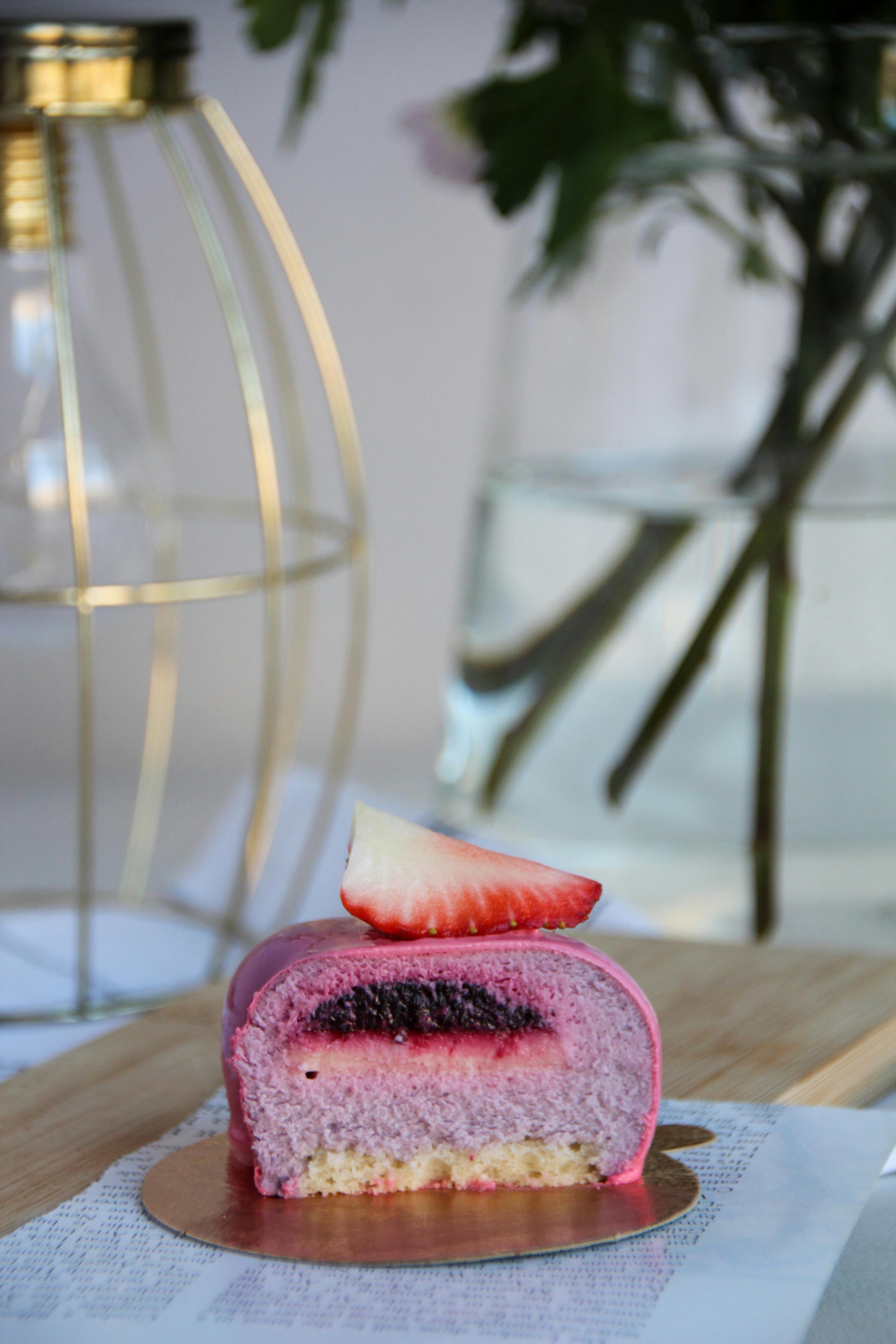 A Slice of Cake with Pink Cream · Free Stock Photo