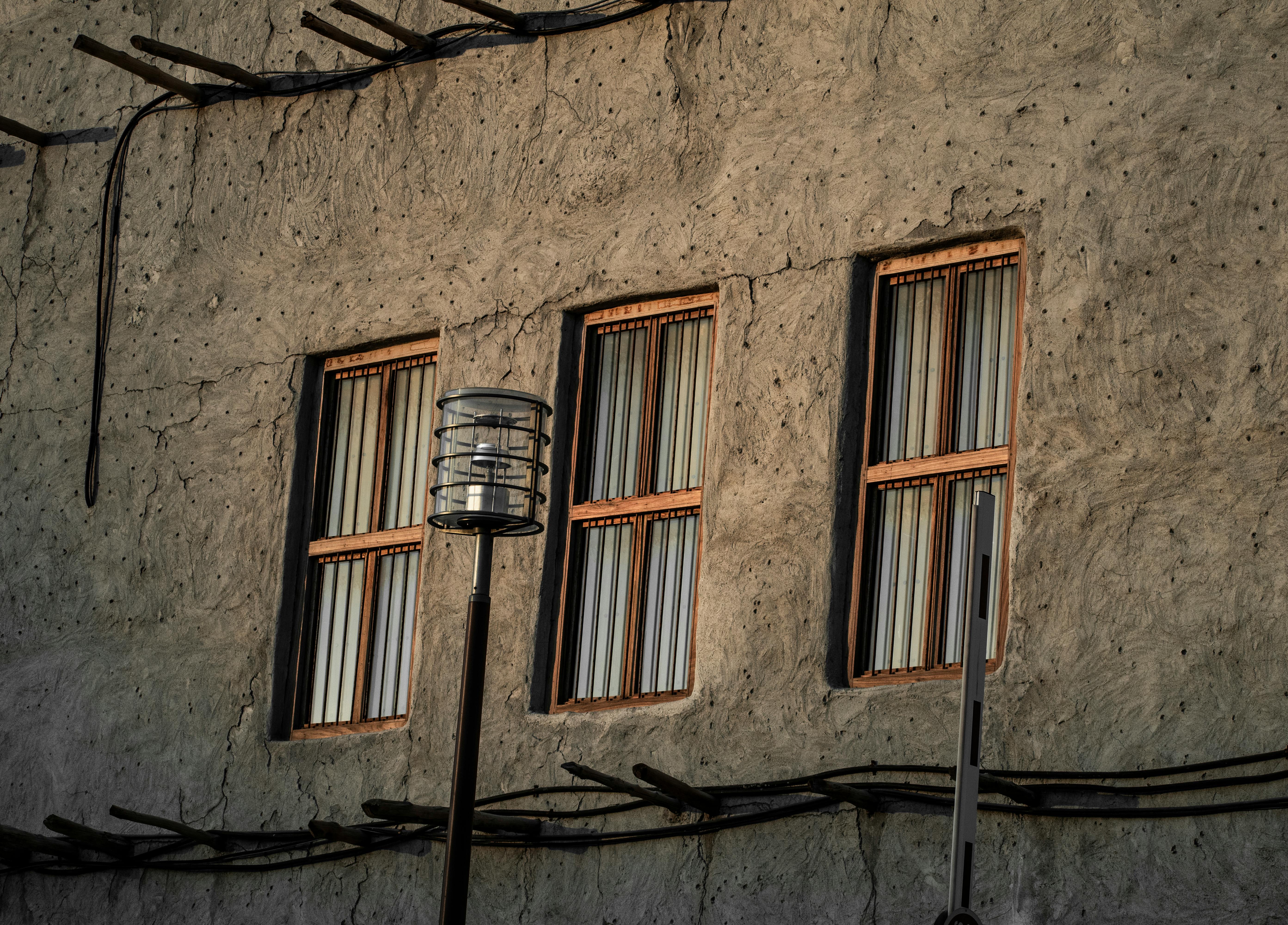 Windows on Building Wall · Free Stock Photo