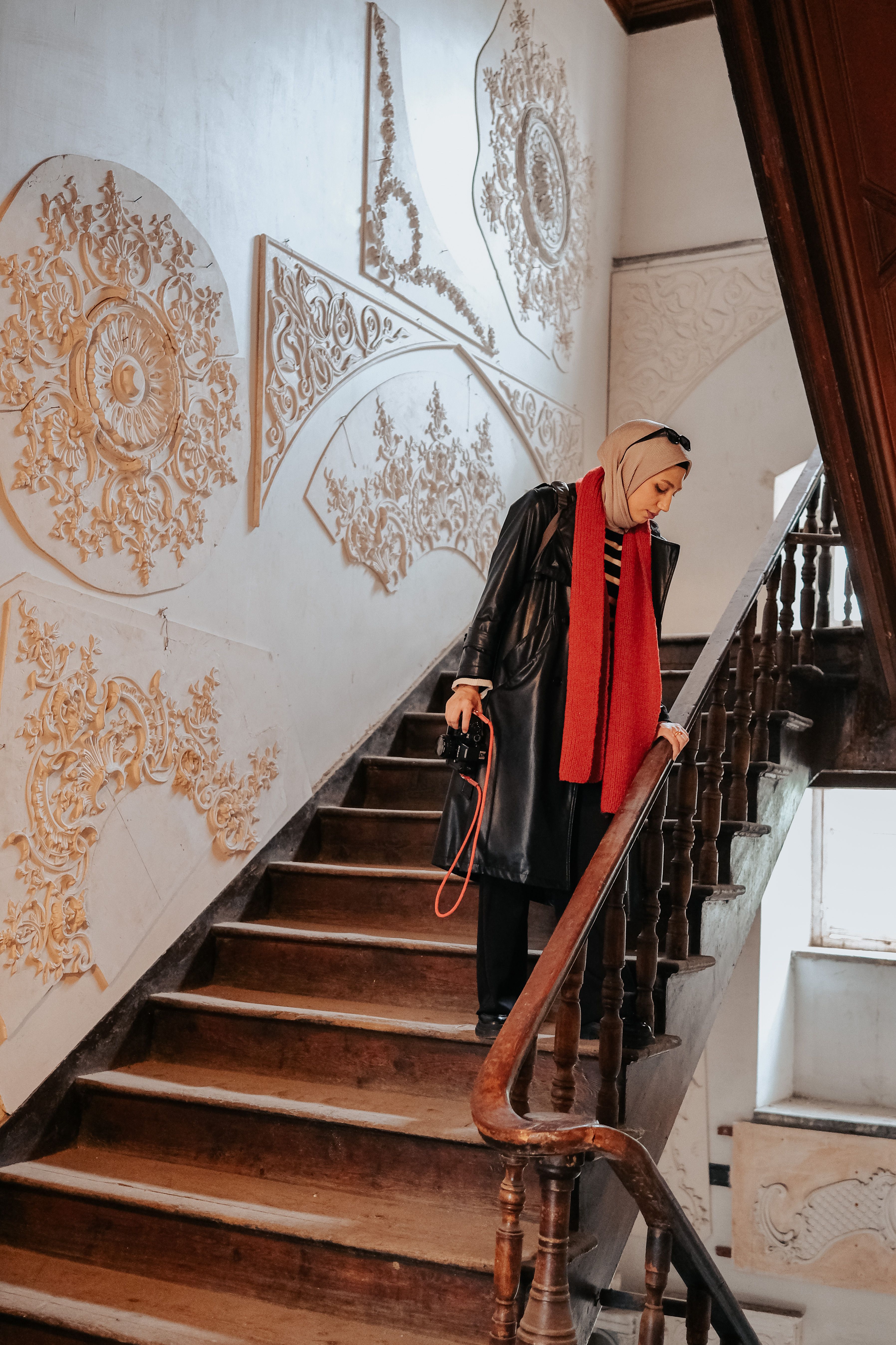 Woman Standing on a Staircase · Free Stock Photo