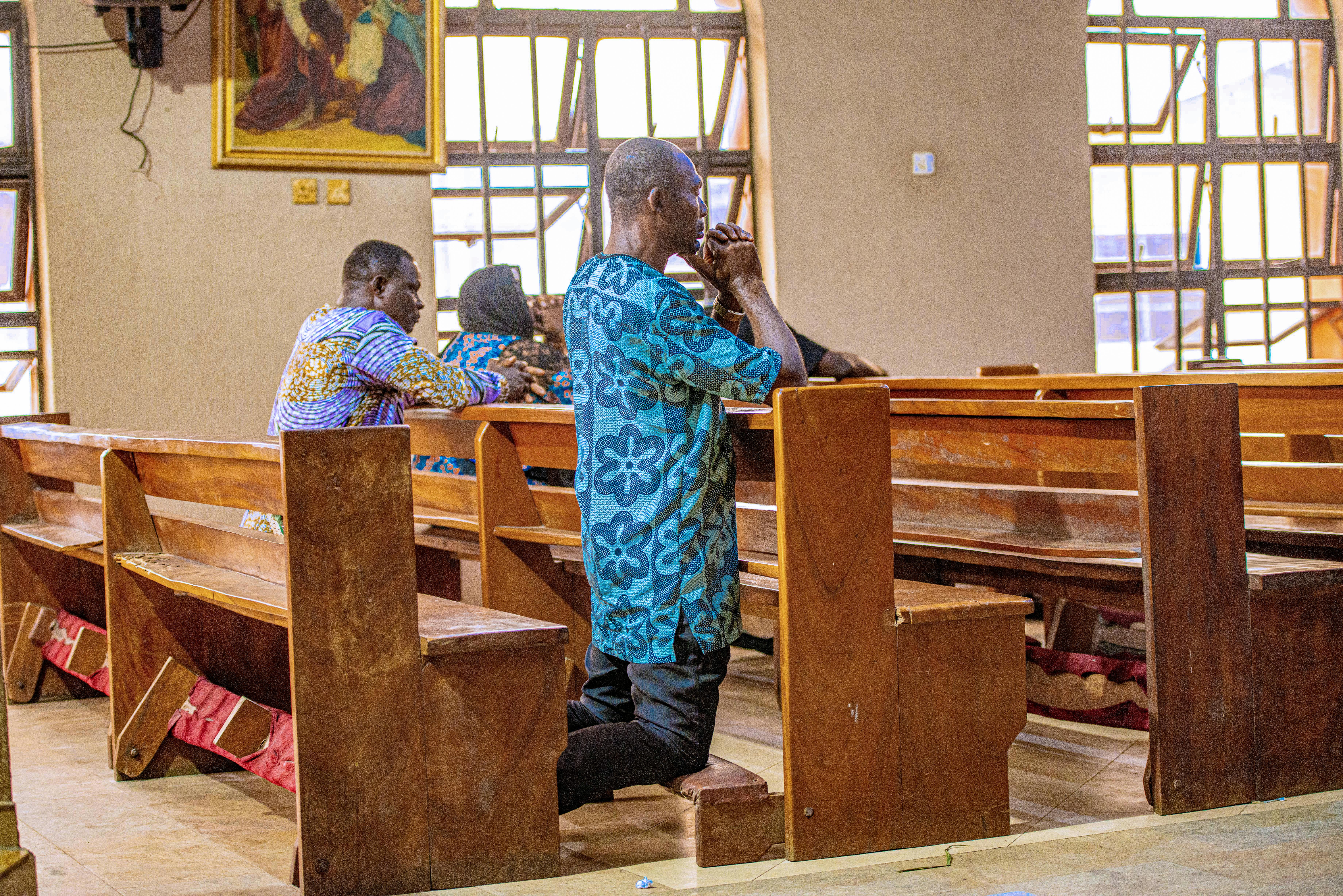 People Praying inside a Church · Free Stock Photo
