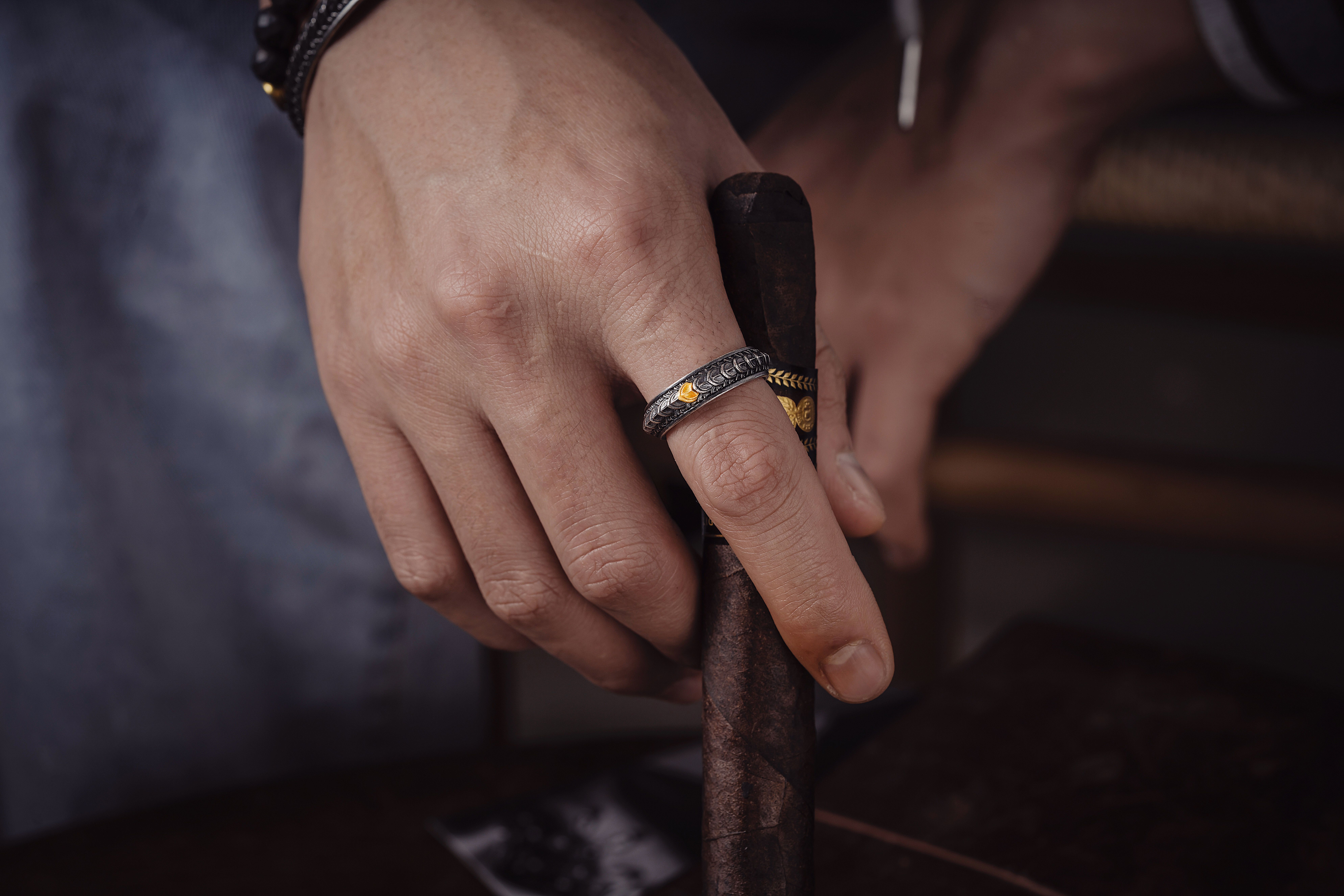 Hand with Ring Holding Pipe · Free Stock Photo