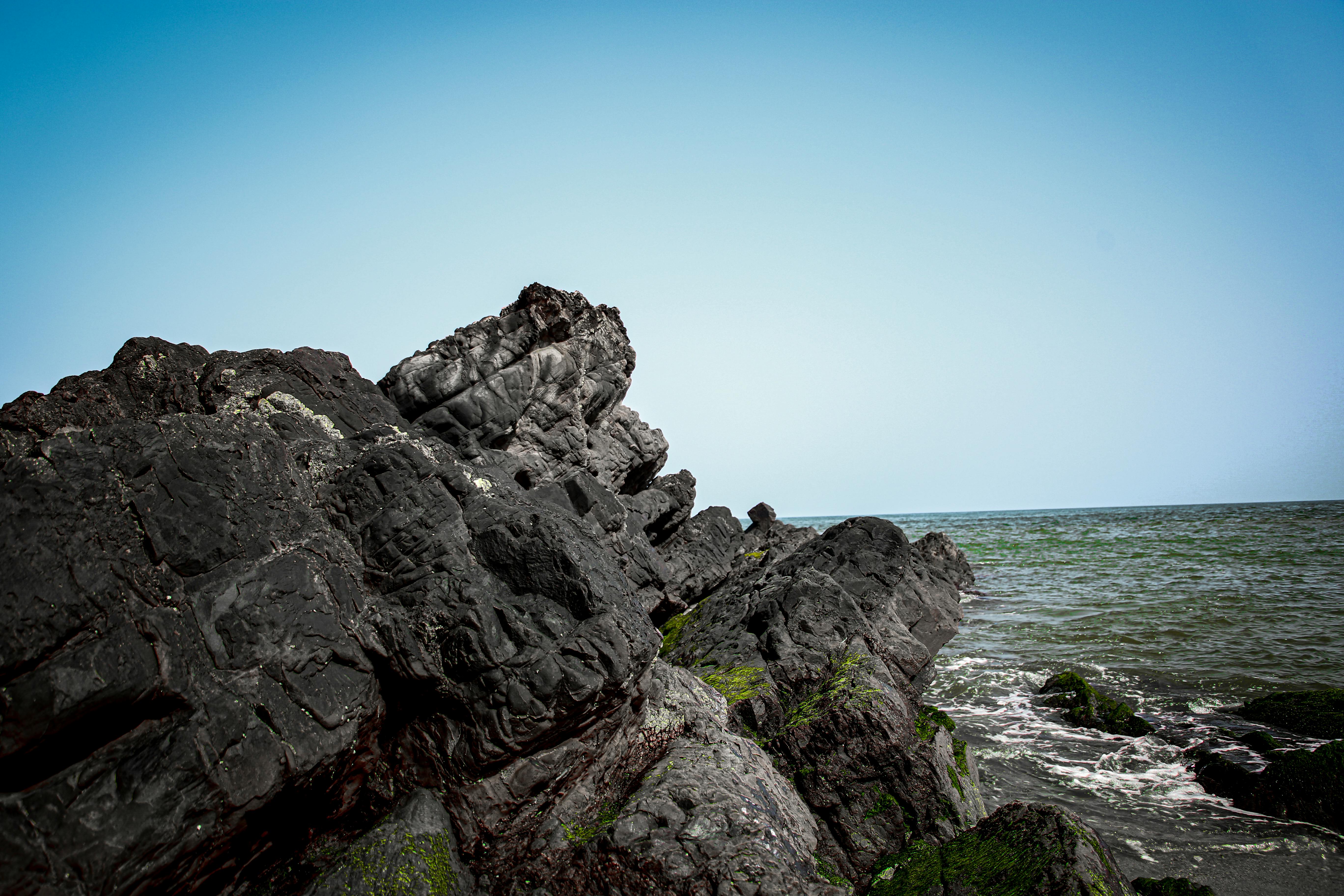 A Rock on a Seashore · Free Stock Photo