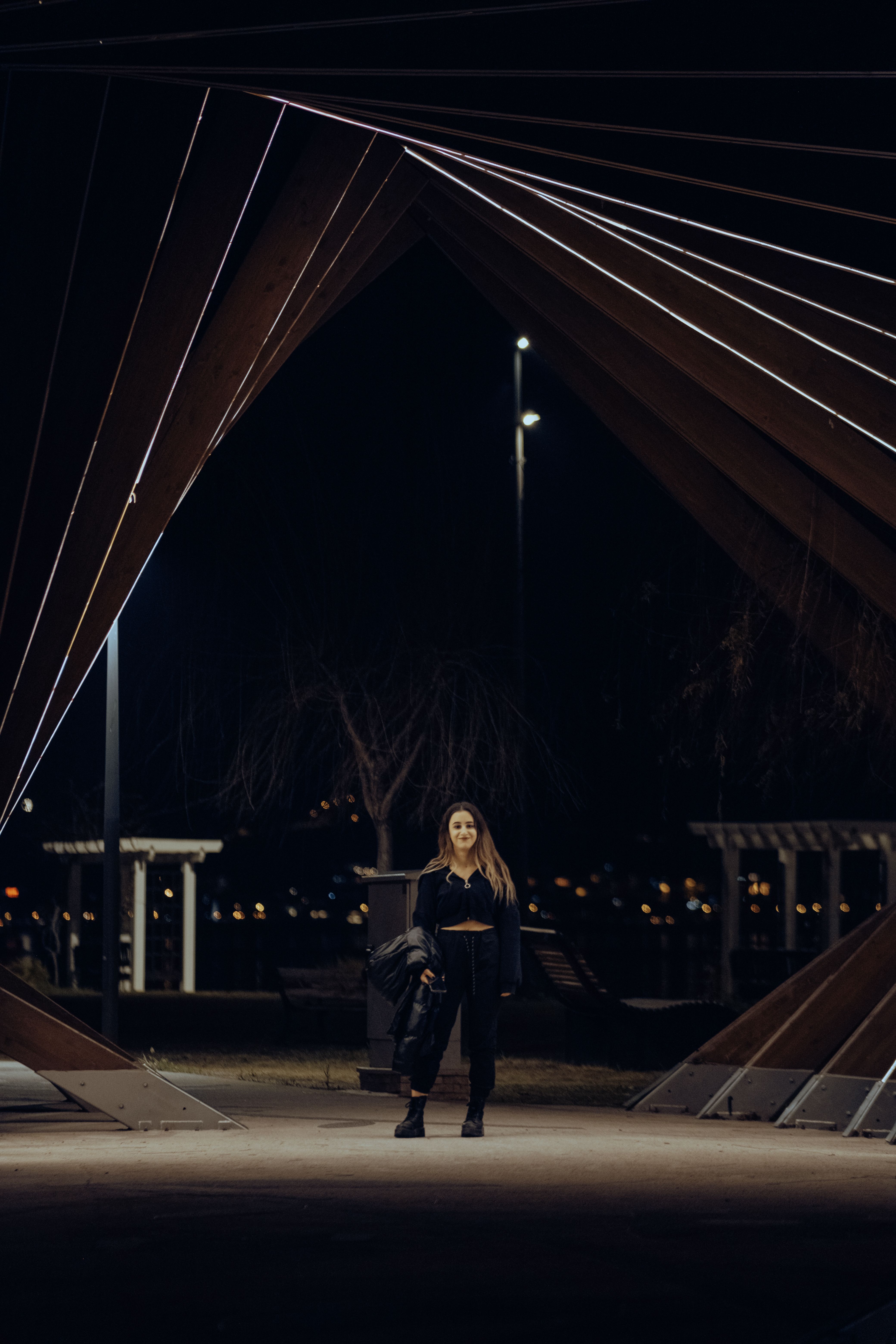 Woman Posing in Park at Night · Free Stock Photo