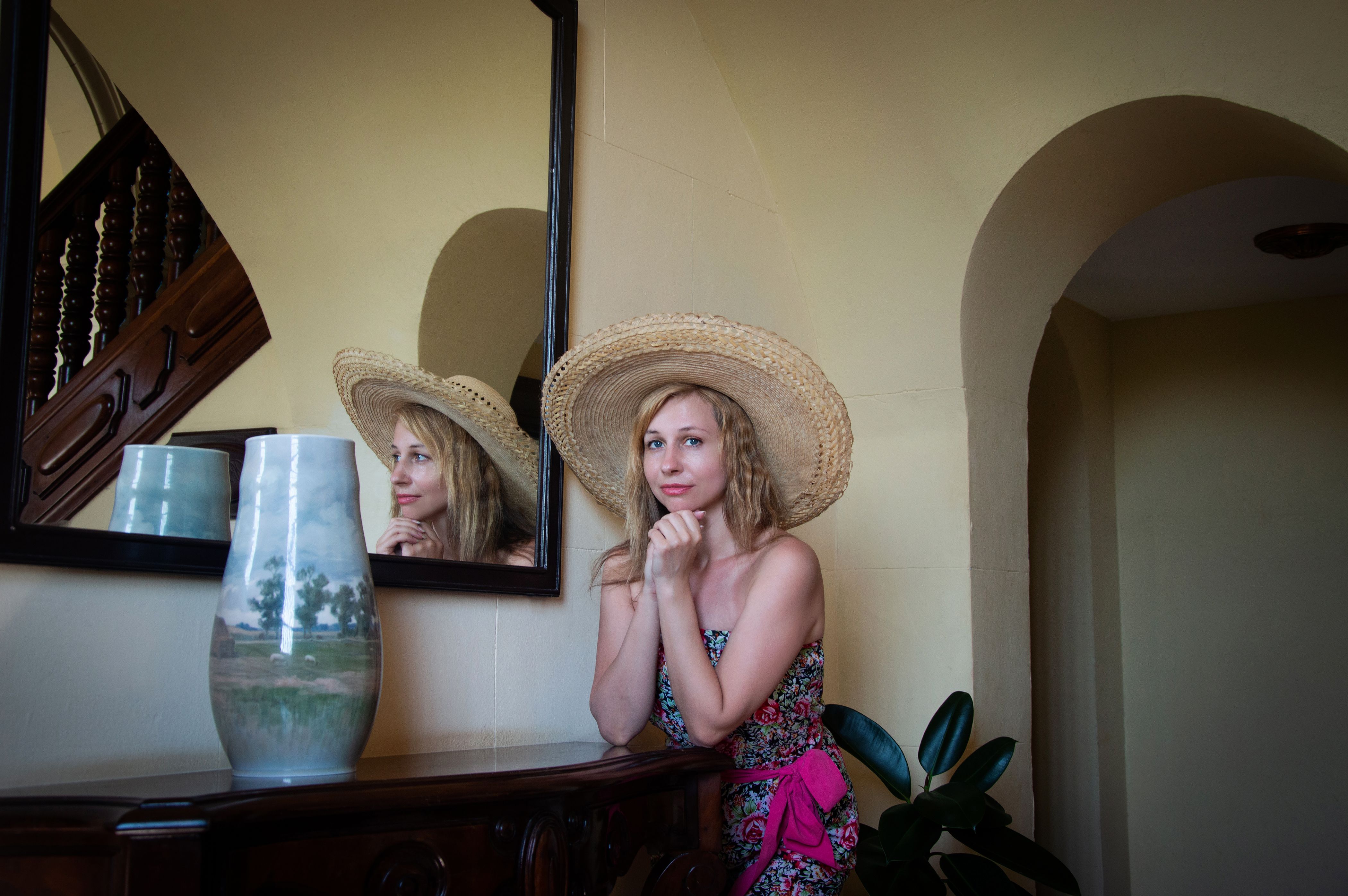 Roses in a Vase by a Mirror and a Reflection of a Woman · Free Stock Photo