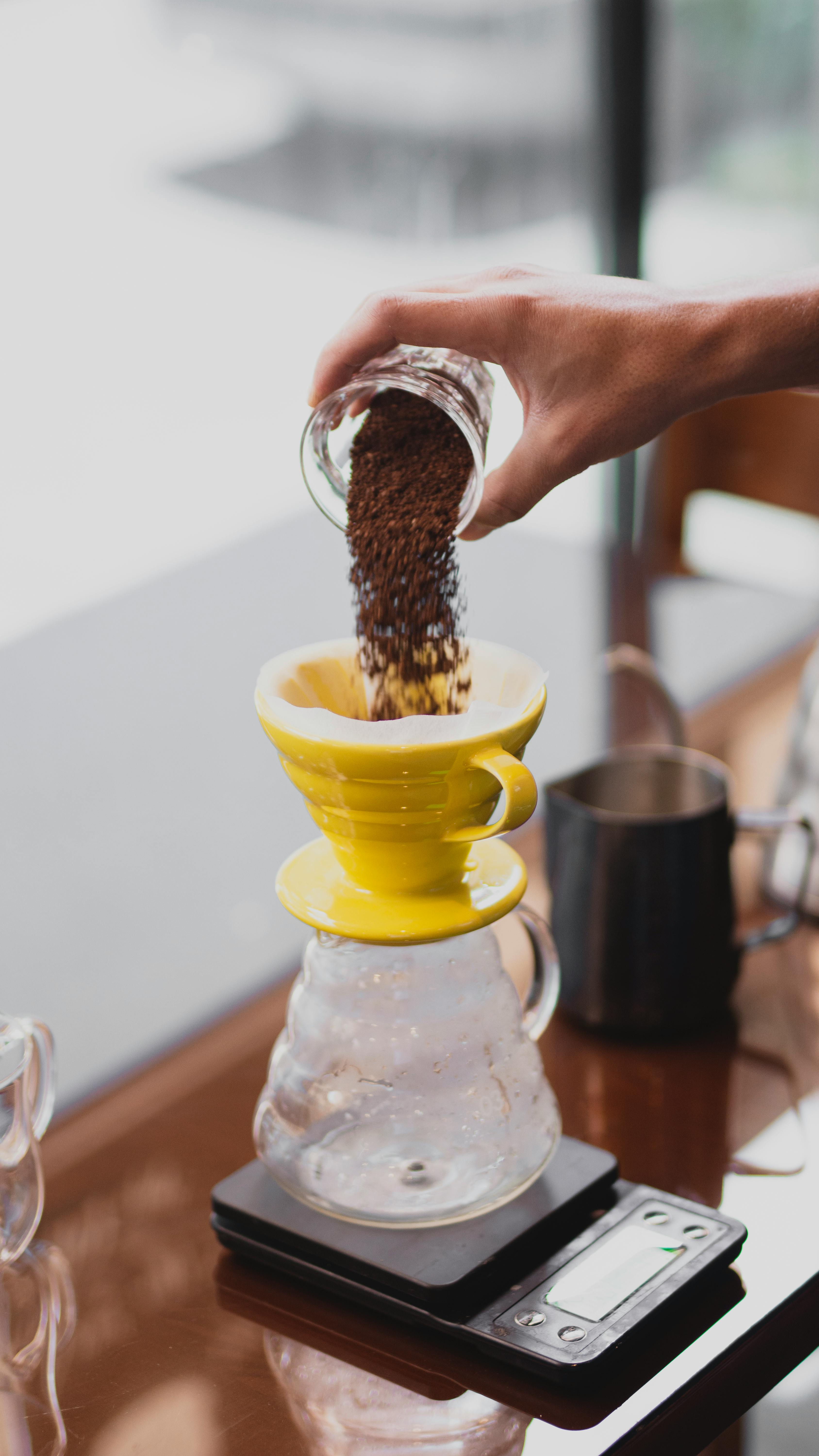 Person Pouring Coffee to Cup · Free Stock Photo
