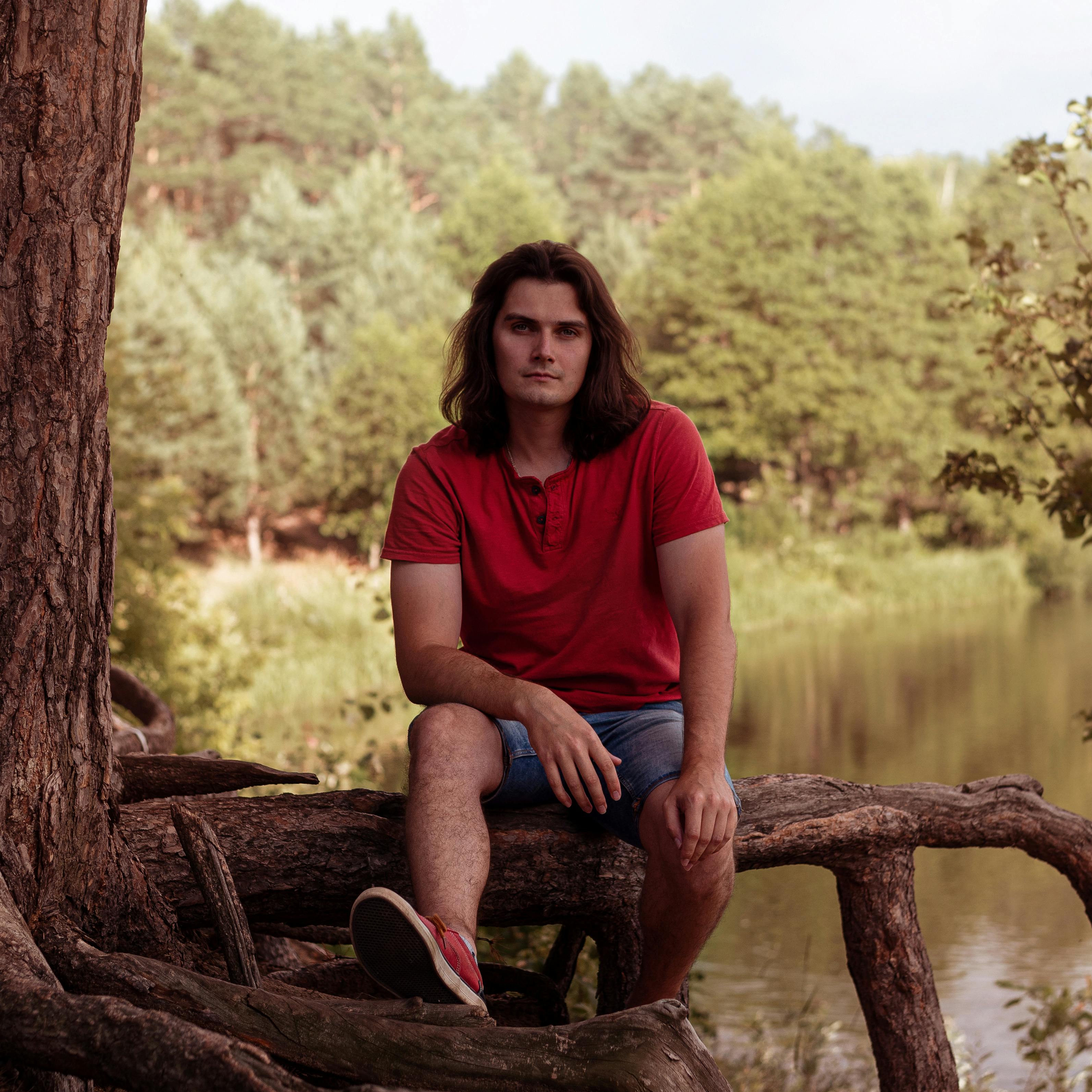 Man on Tree Roots · Free Stock Photo