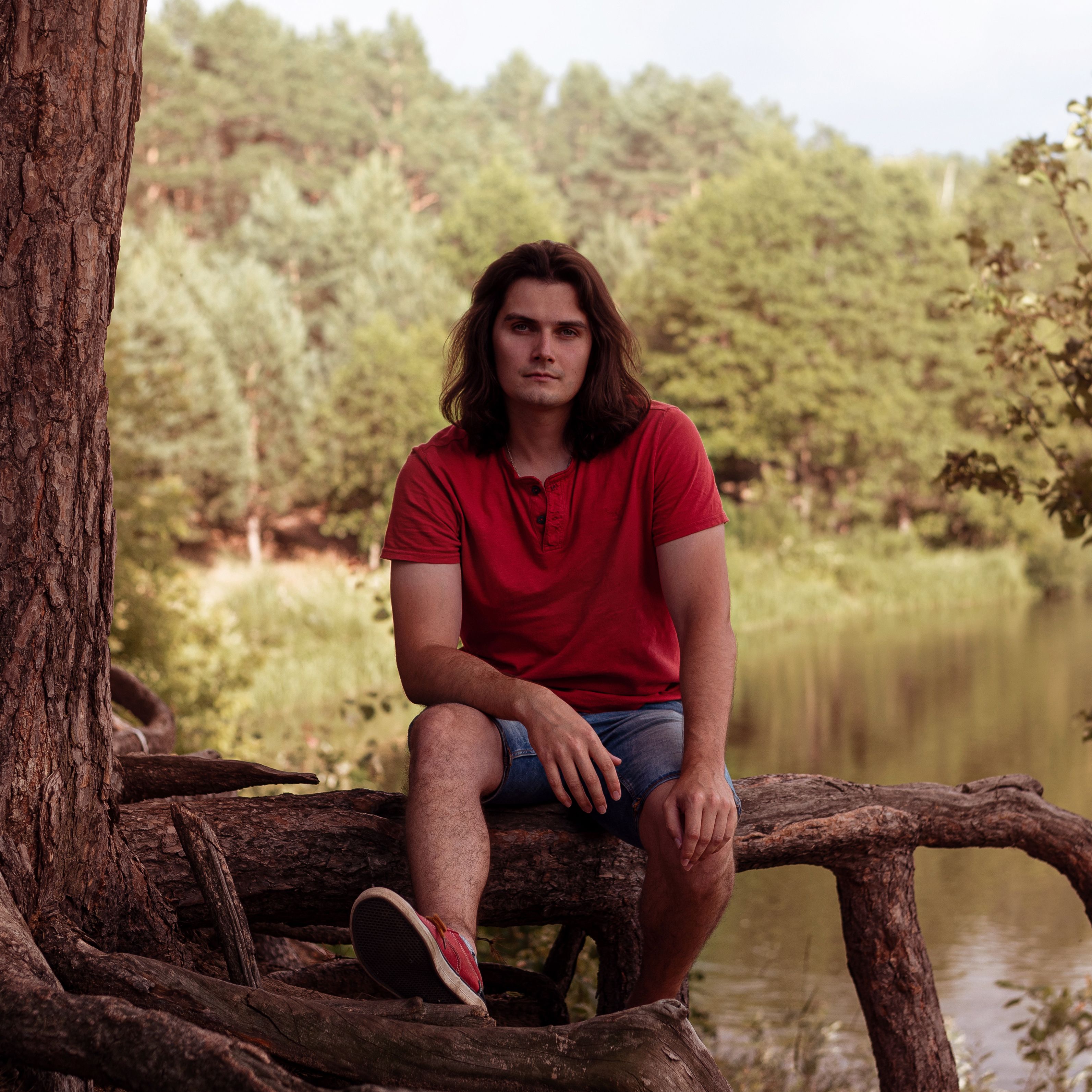 Man on Tree Roots · Free Stock Photo