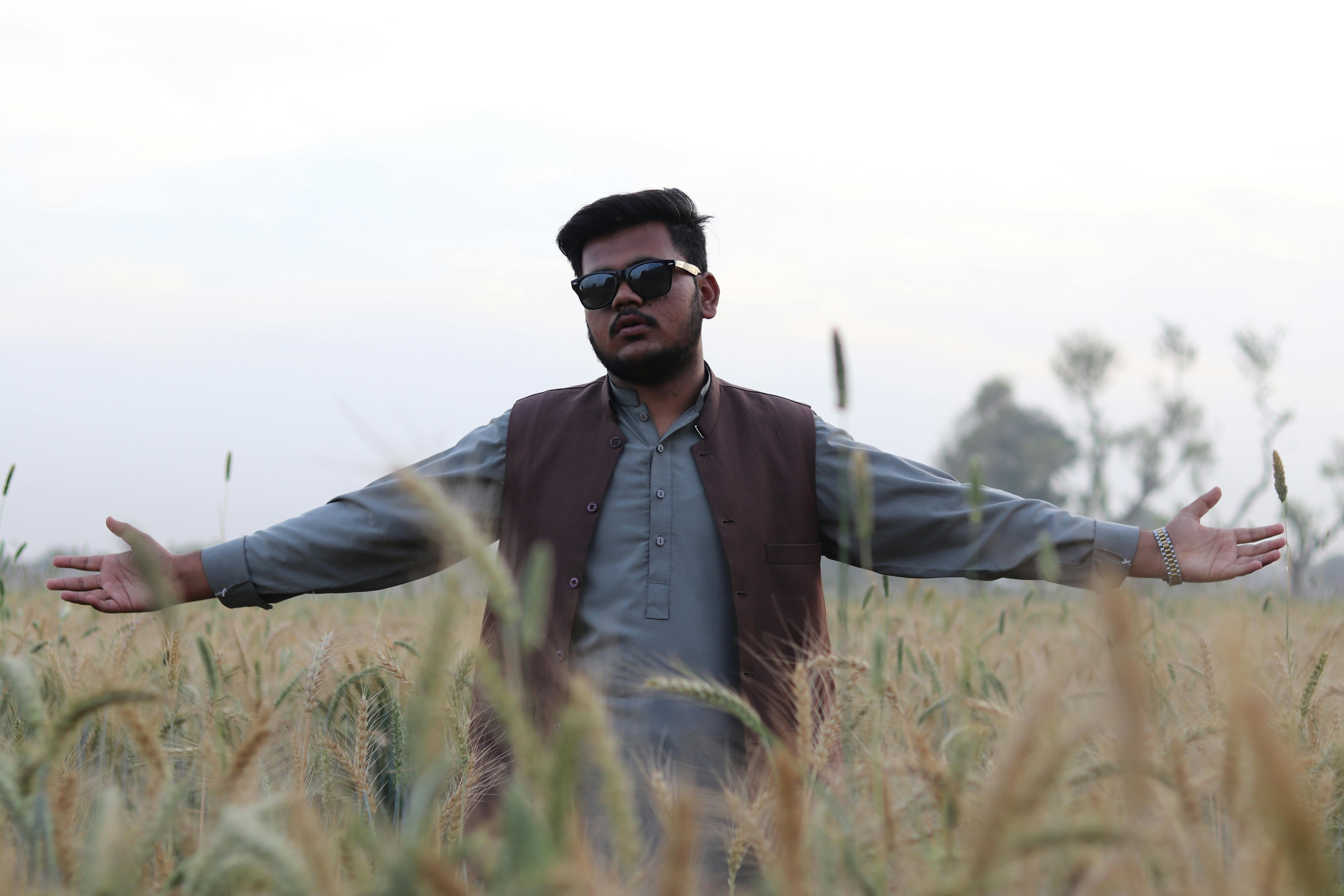 Woman Meditating in Rural Scenery · Free Stock Photo