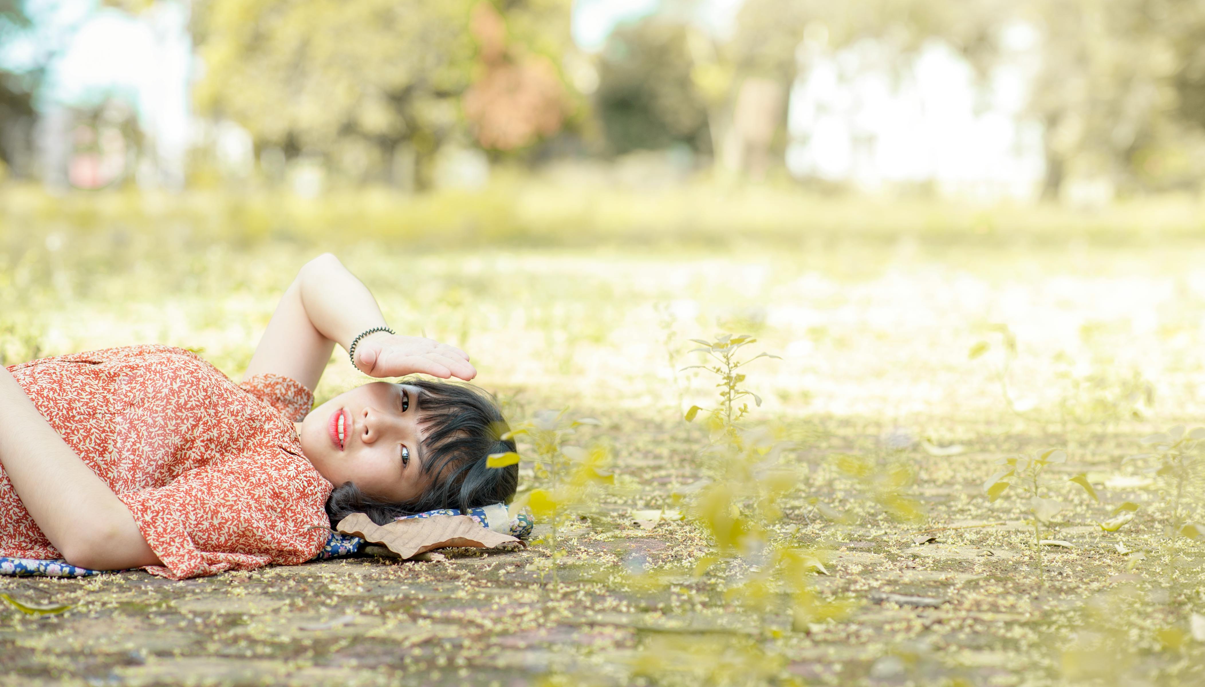 Photo of Woman Laying On Ground · Free Stock Photo
