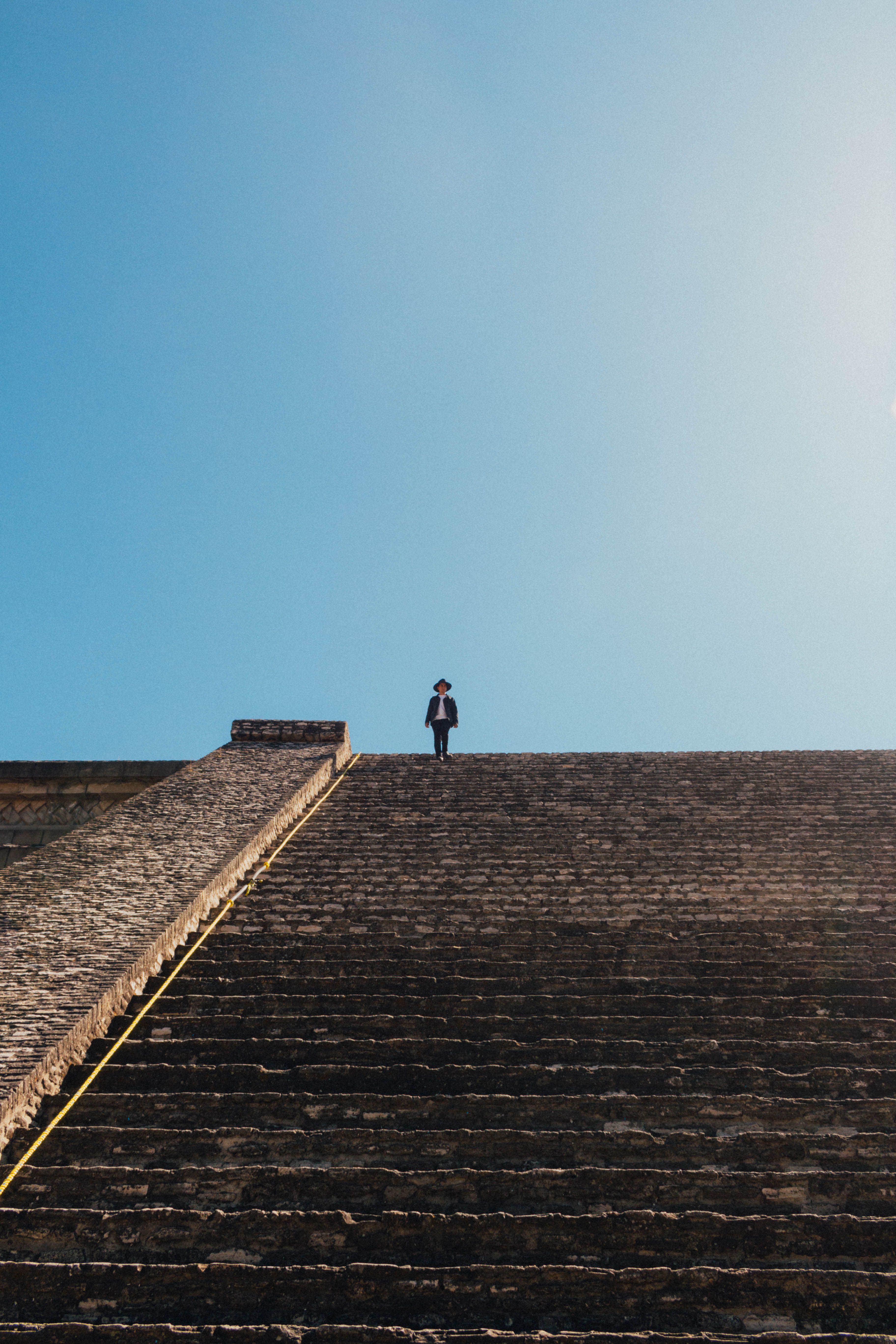 A Person Standing on Top of Steps · Free Stock Photo