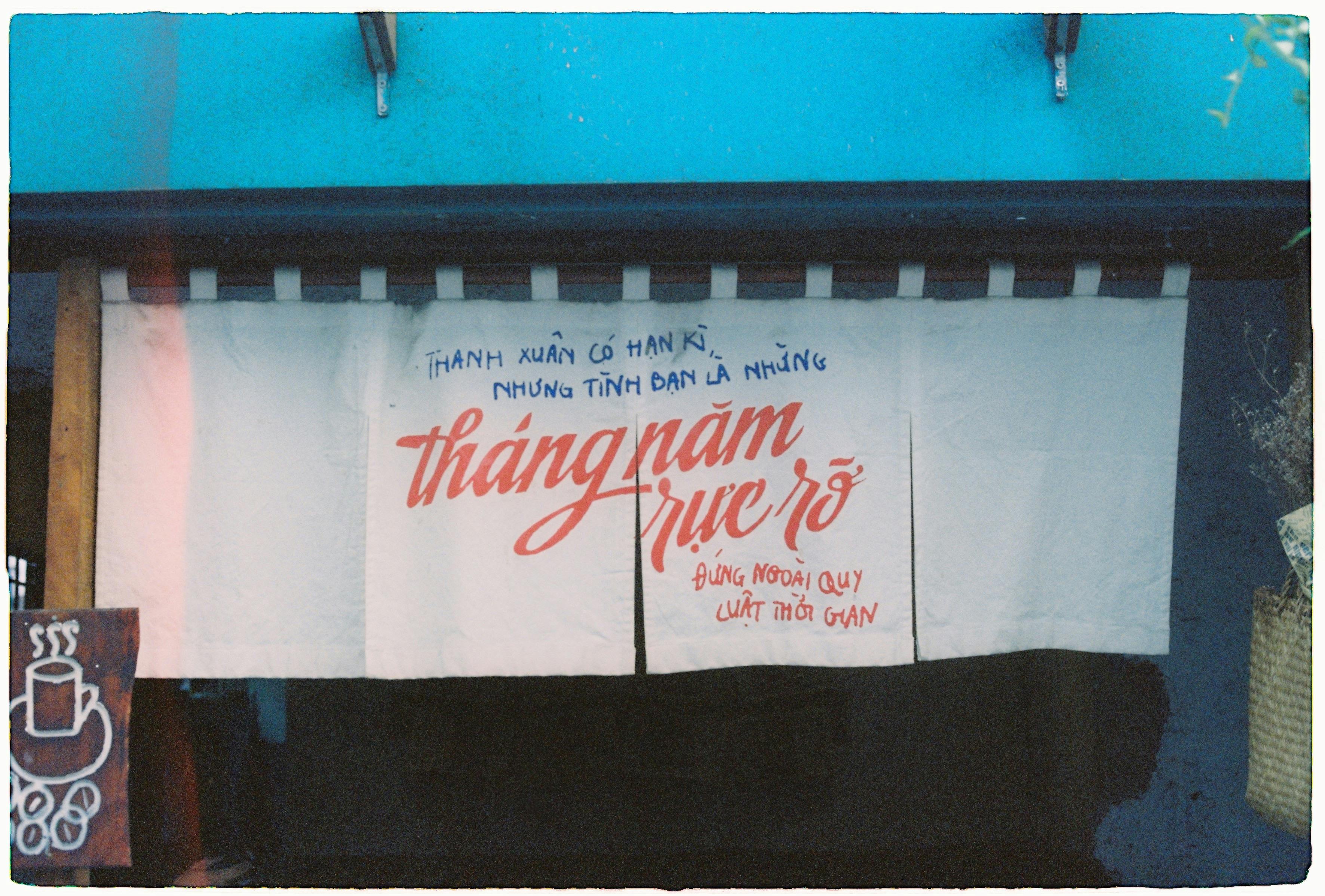 Curtain with Message in Restaurant Entrance · Free Stock Photo