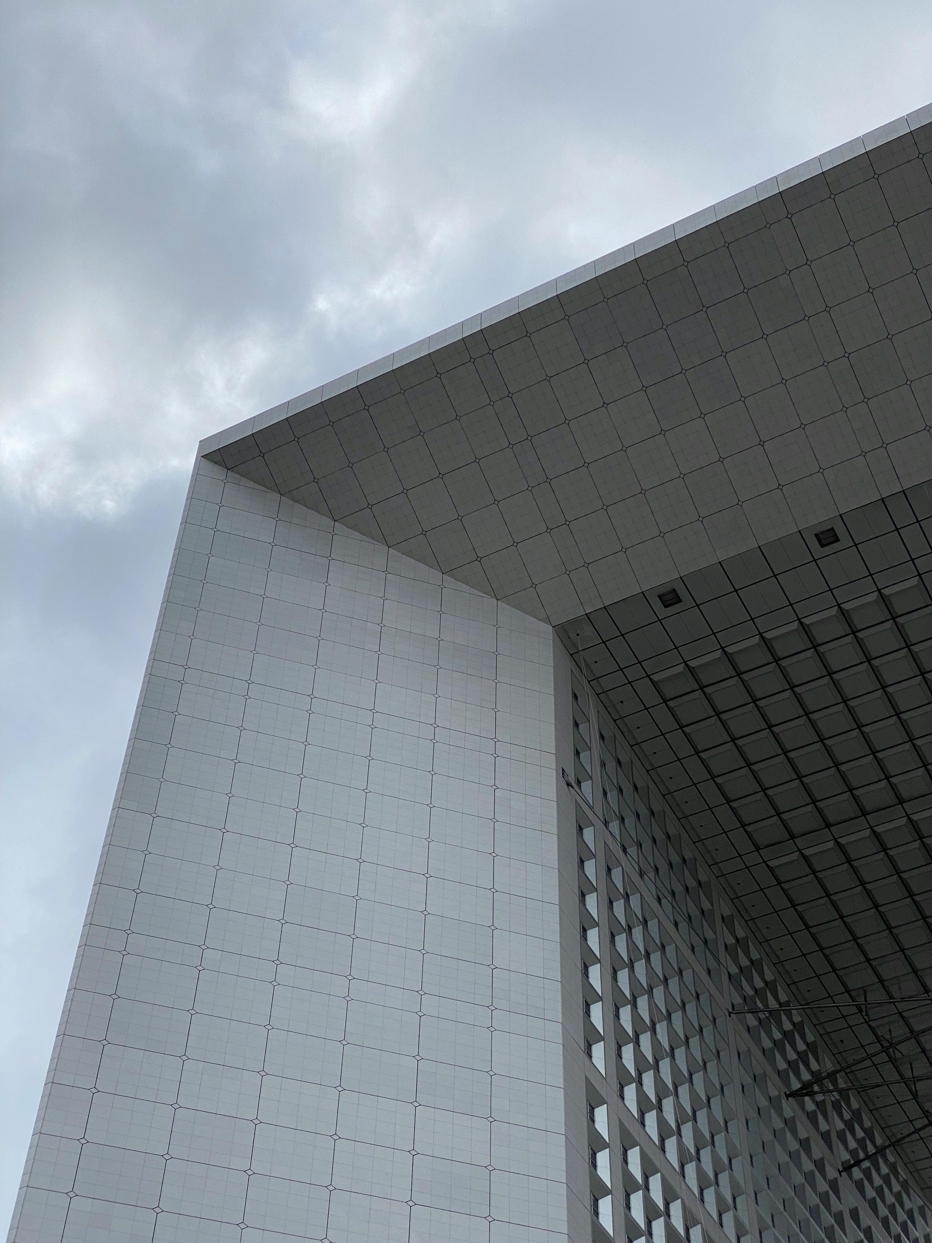 Gray Concrete High-rise Building · Free Stock Photo