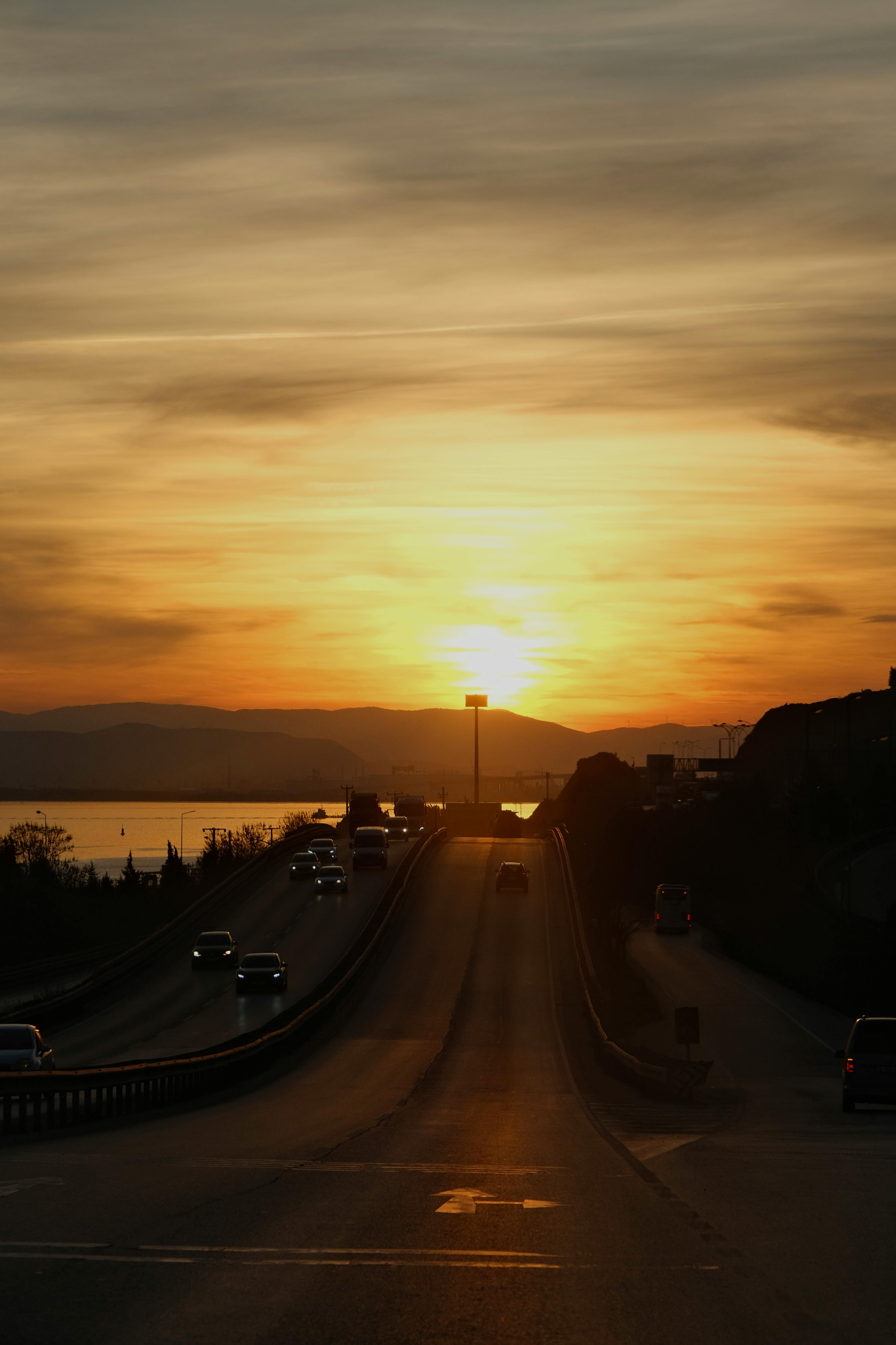 Highway at Sunset · Free Stock Photo