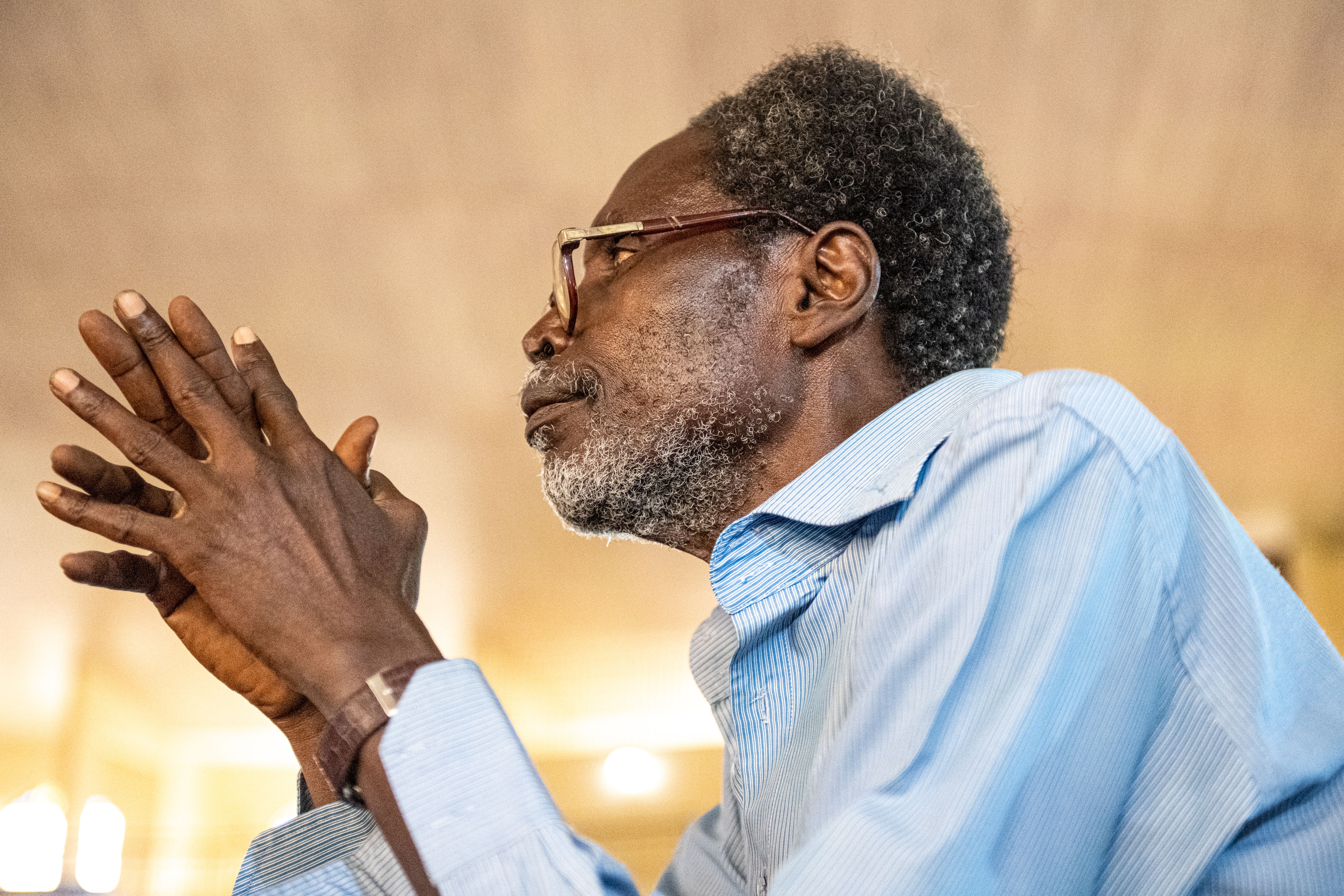 Senior Man Praying in a Church · Free Stock Photo