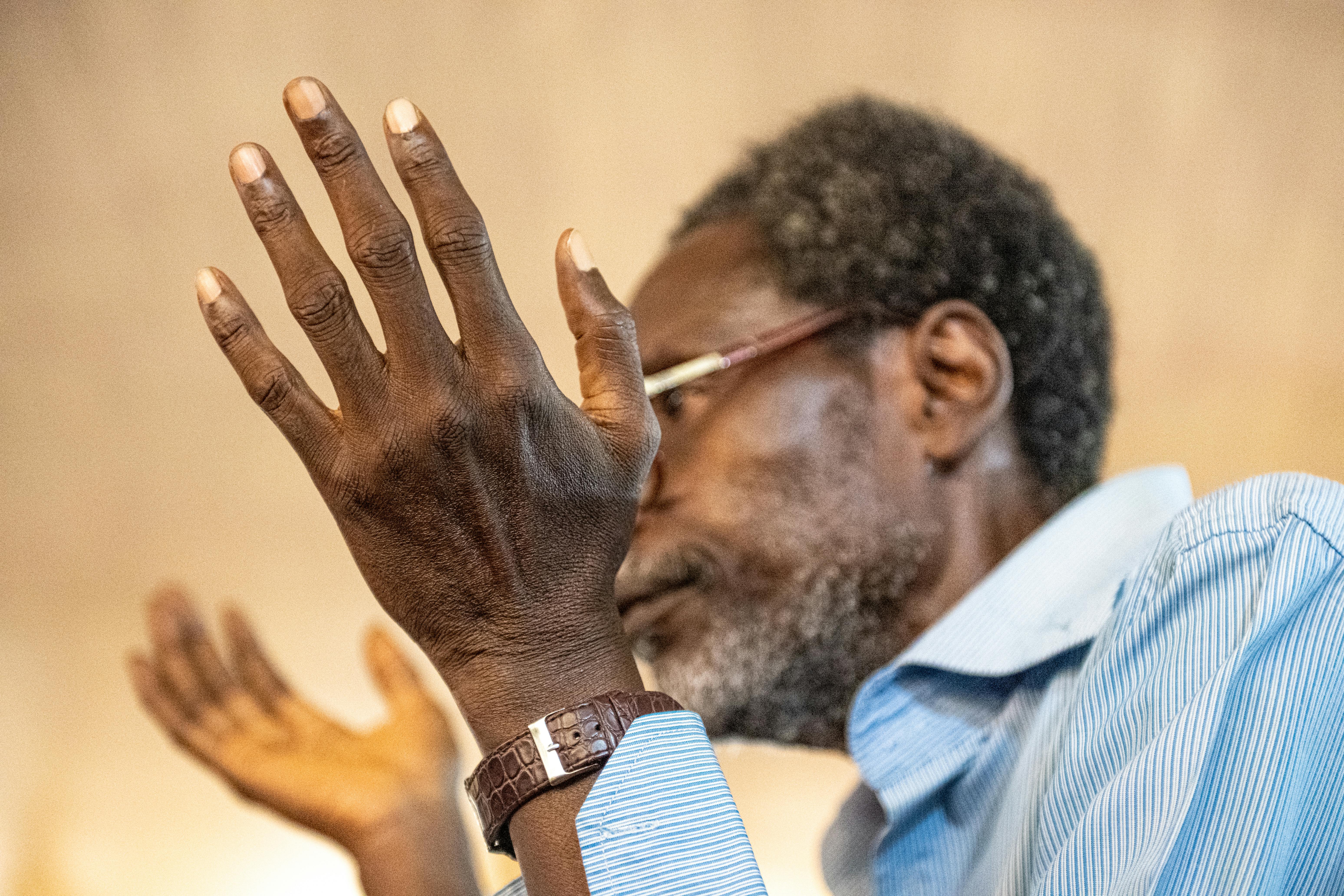 Men Praying Together · Free Stock Photo
