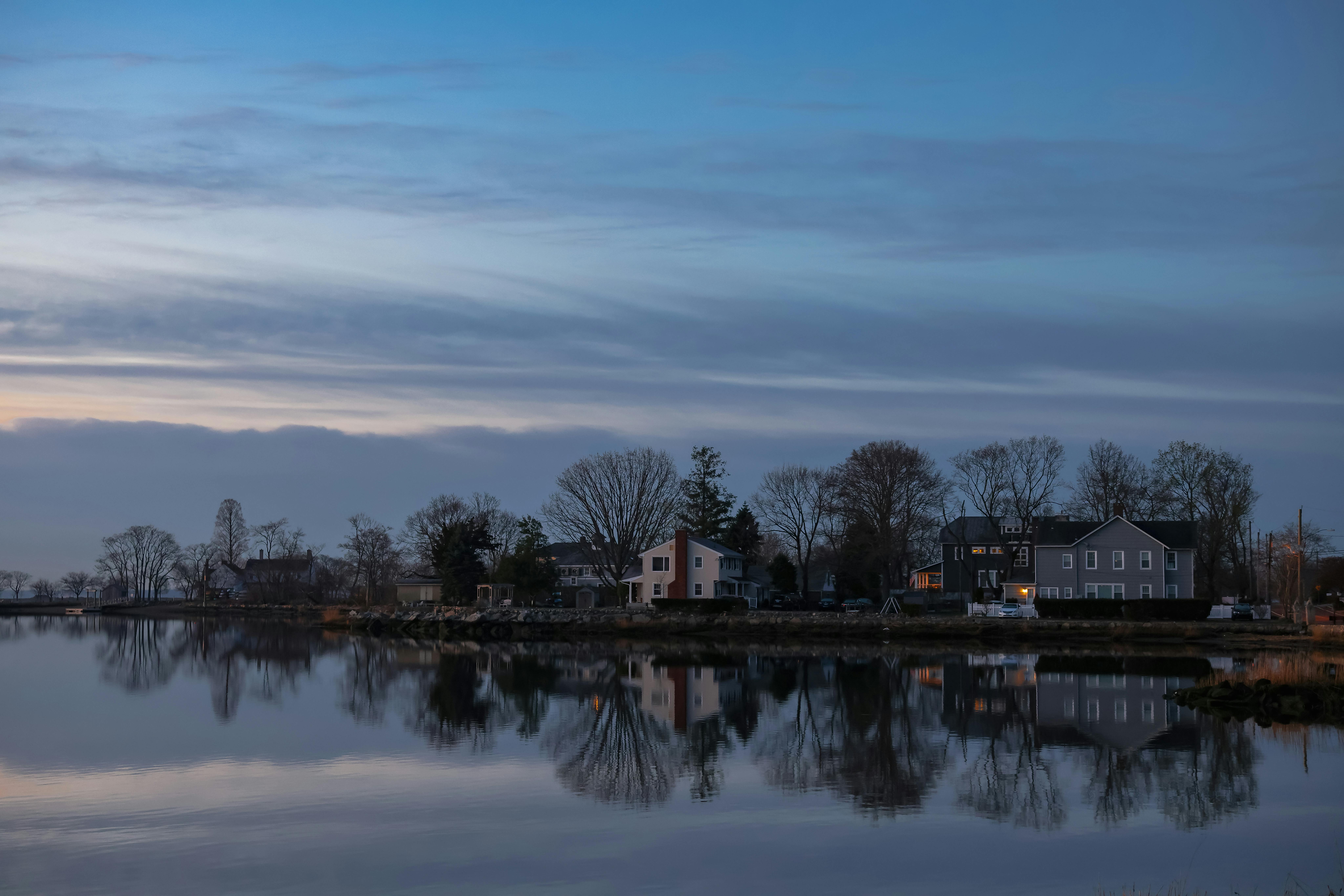 Houses on River Bank at Night · Free Stock Photo