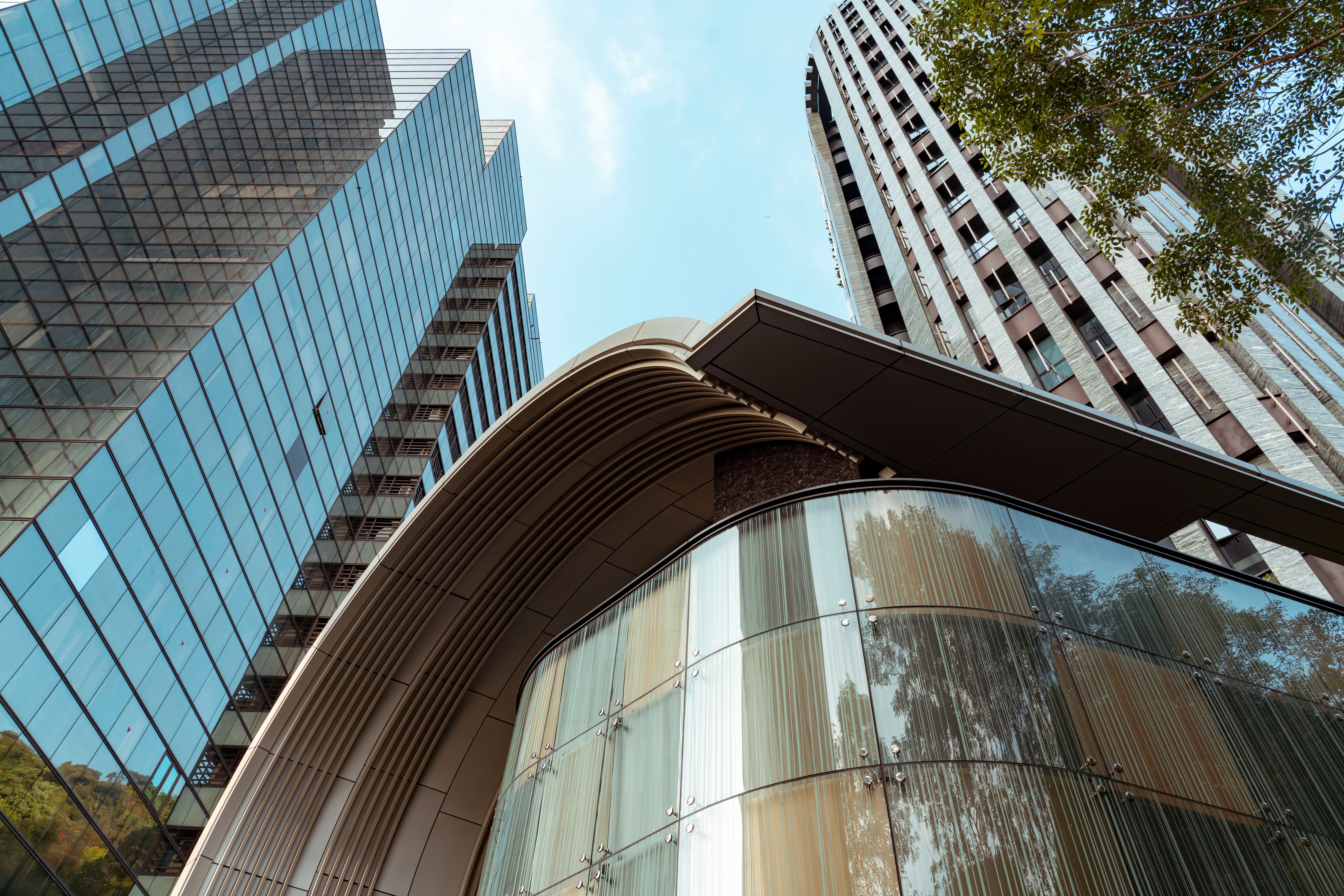 Low Angle Shot of Modern City Buildings · Free Stock Photo