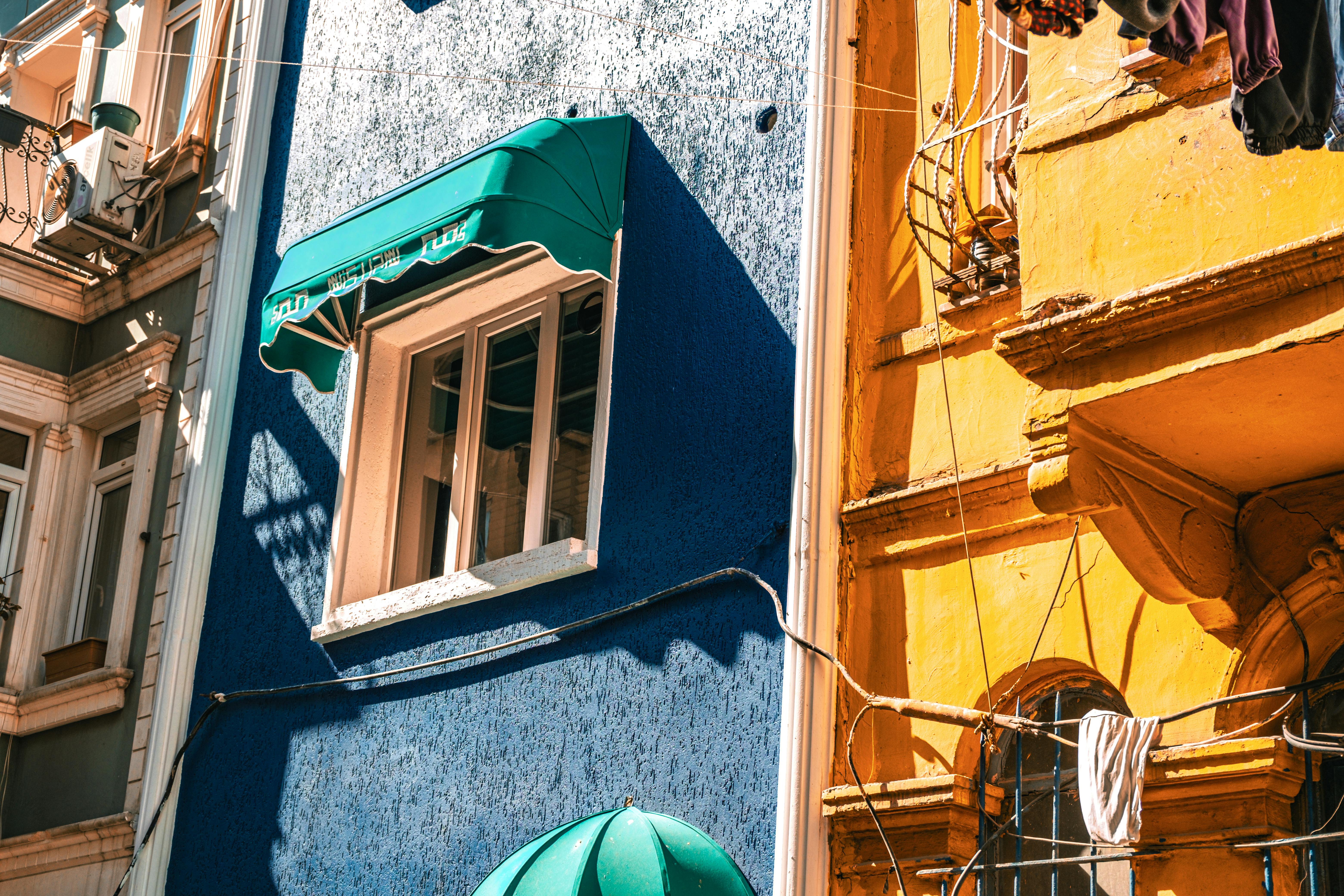 Multi-colored Concrete Building · Free Stock Photo