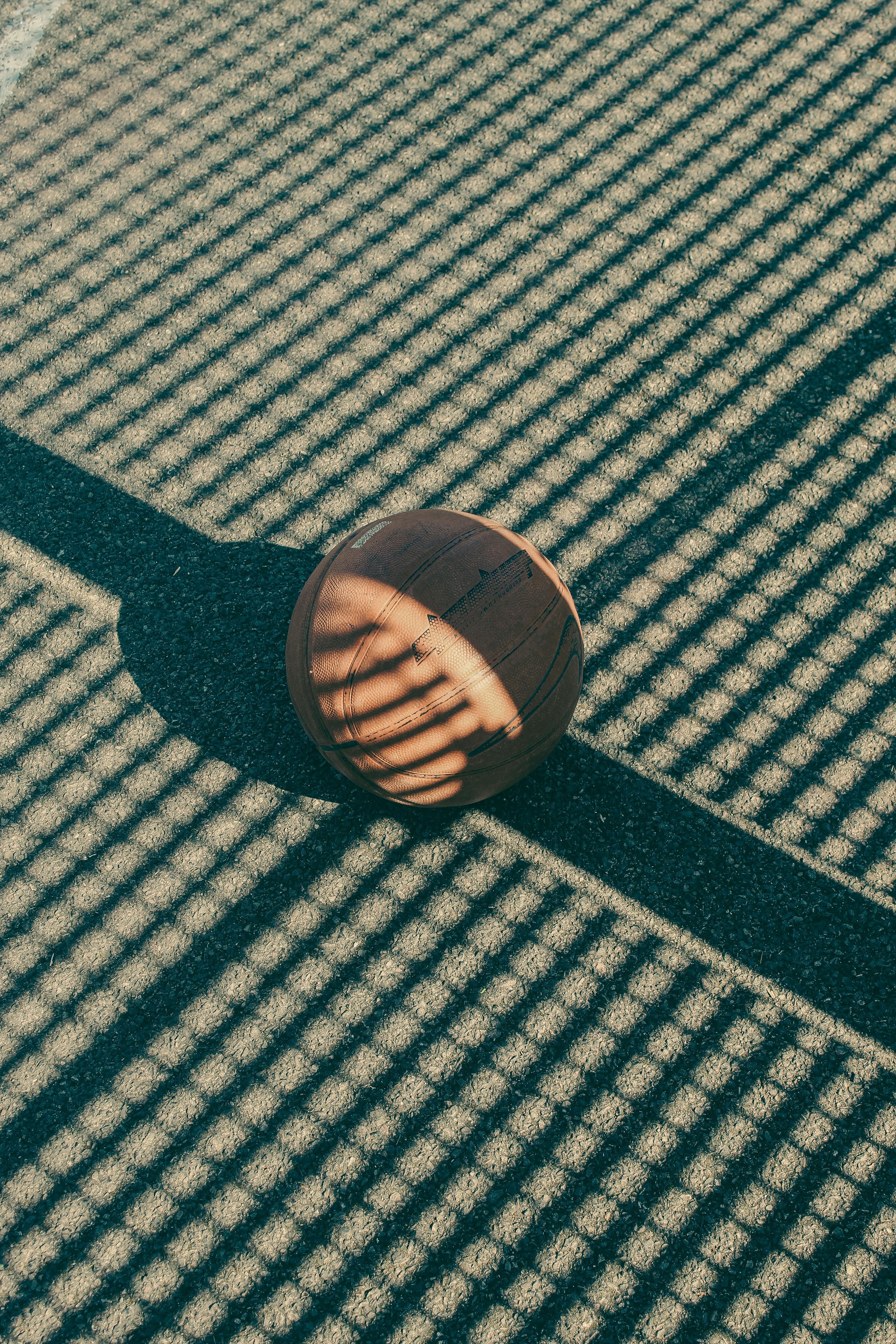 Shadows around Basketball Ball · Free Stock Photo