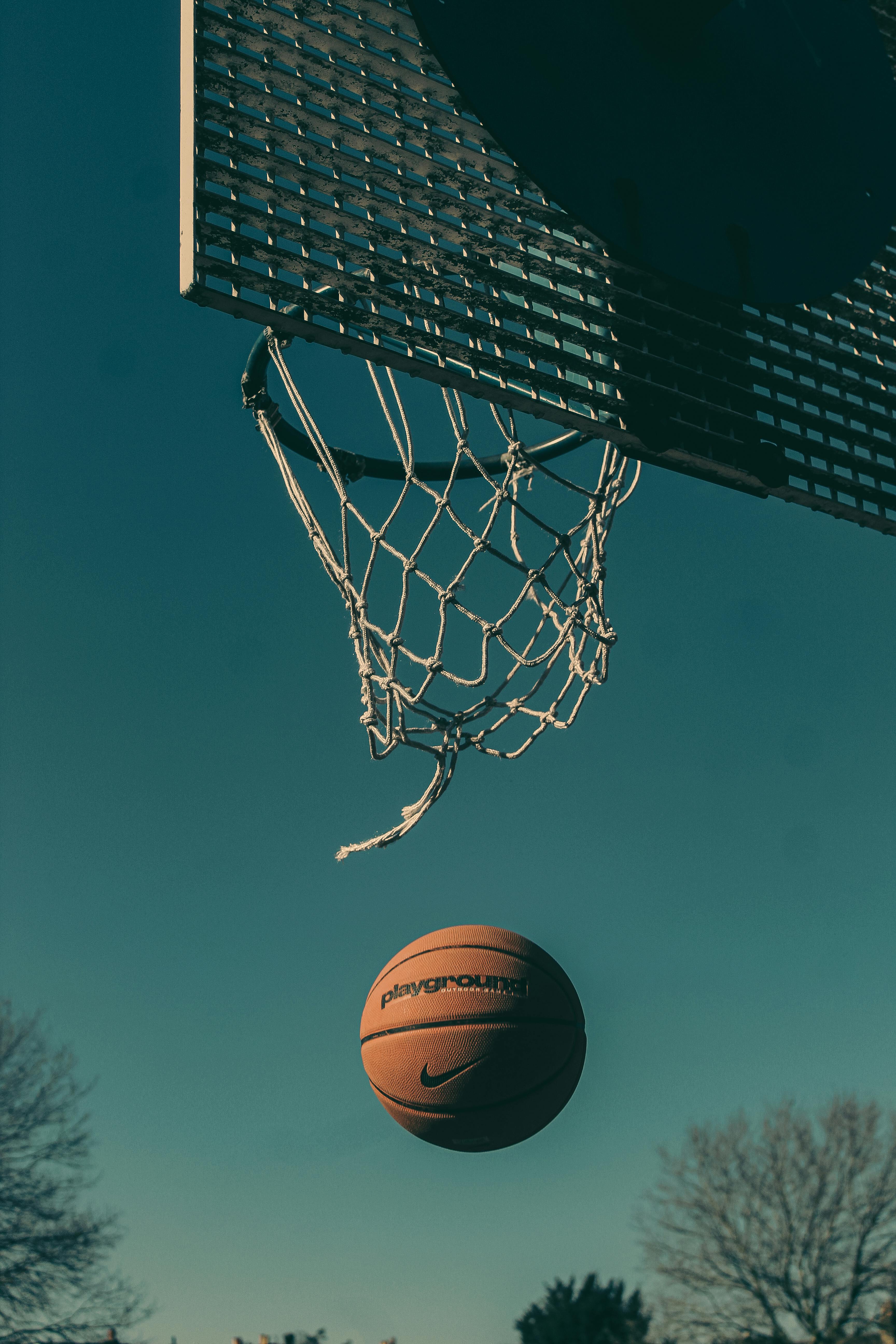 Ball Falling from Basketball Hoop · Free Stock Photo