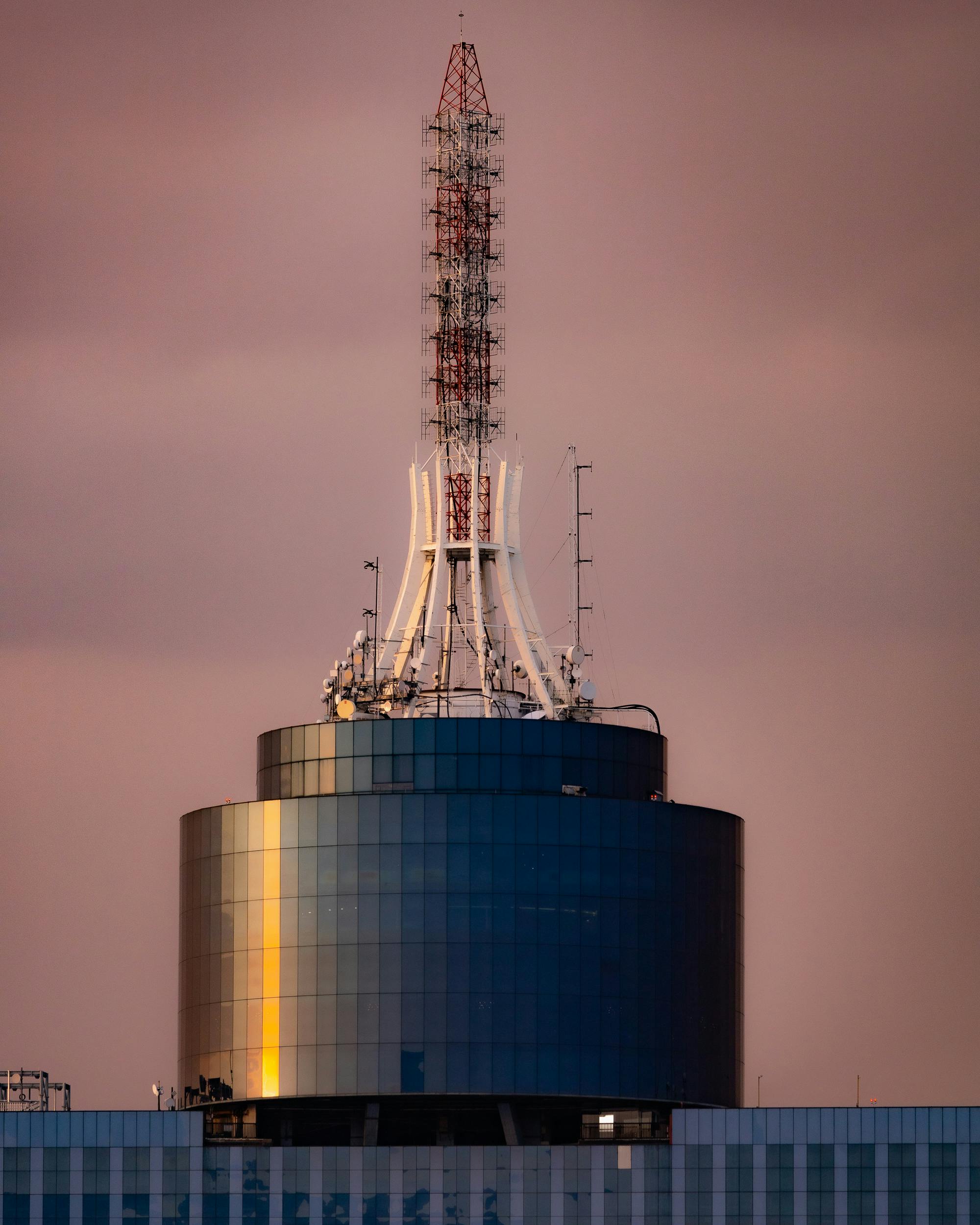 Person Standing at the edge of Building at Night · Free Stock Photo